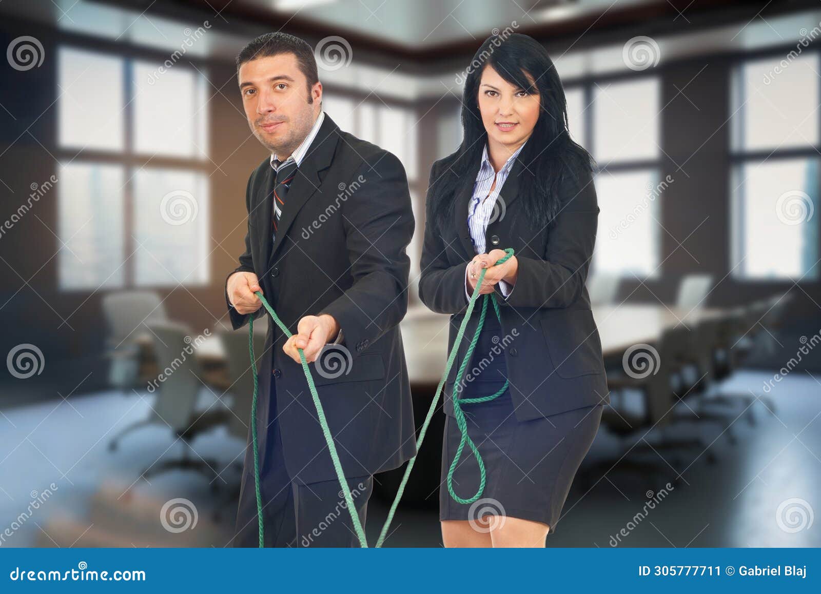 Two Young Business People Pull the Problems Stock Image - Image of ...