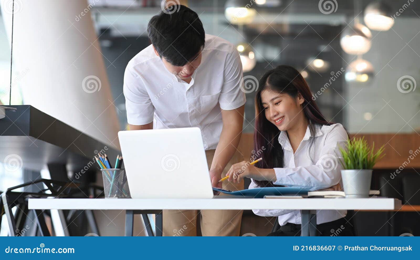 Two Business People Talking Each Other and Working Together in Modern ...