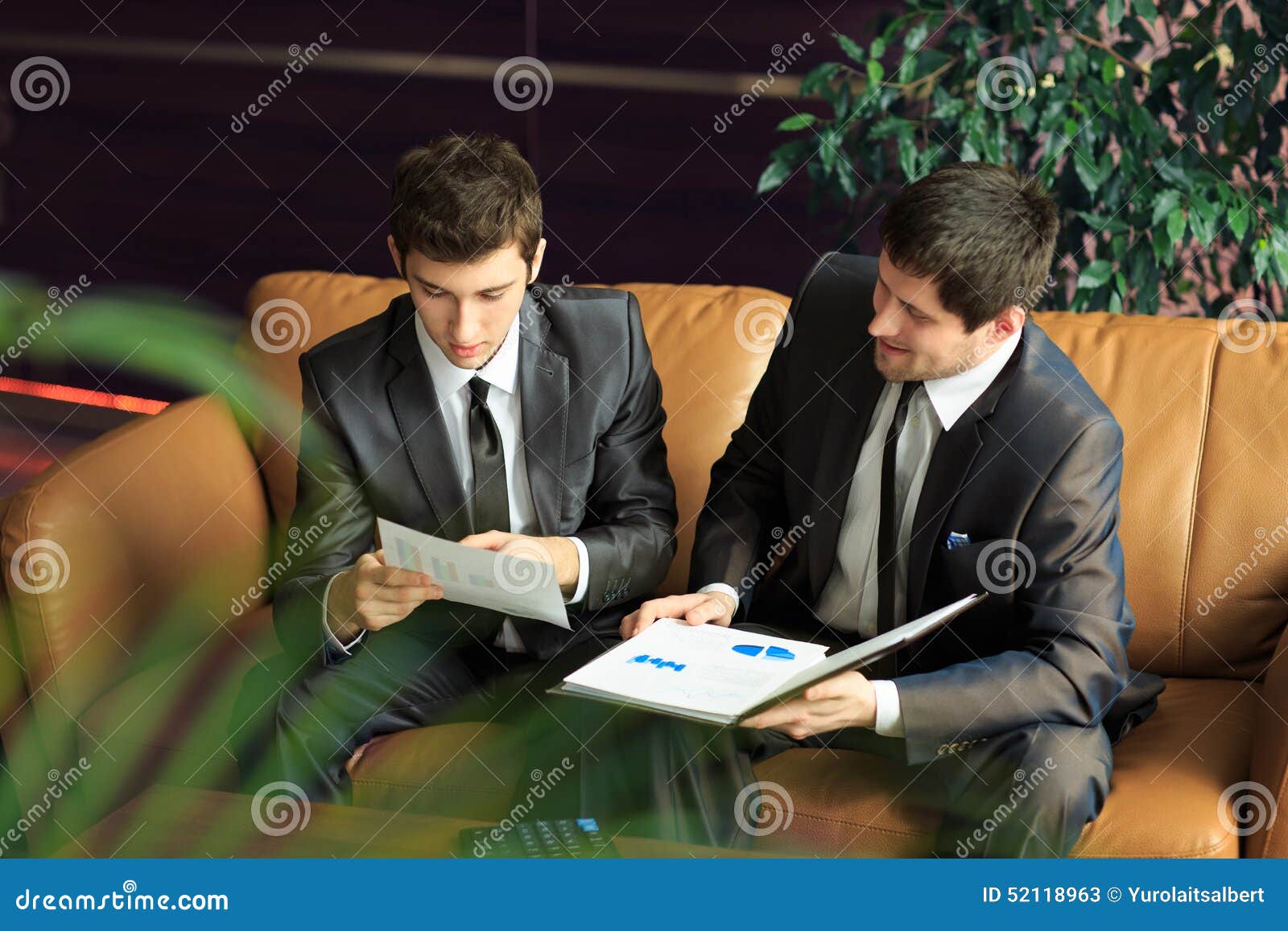 Two Young Businessmen Discussing Project Stock Image - Image of ...