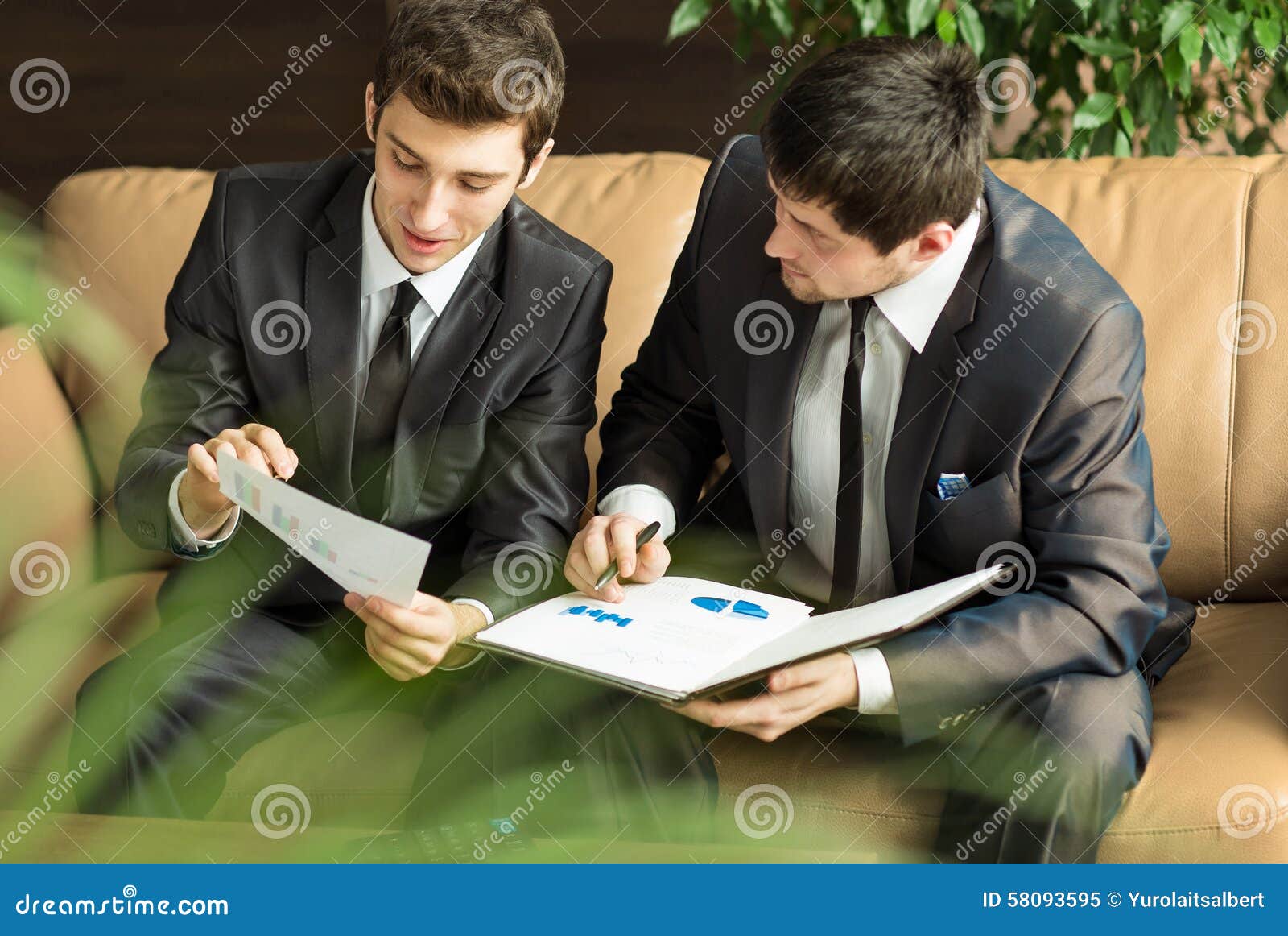 Two Young Businessmen Discussing Project Stock Image - Image of ...
