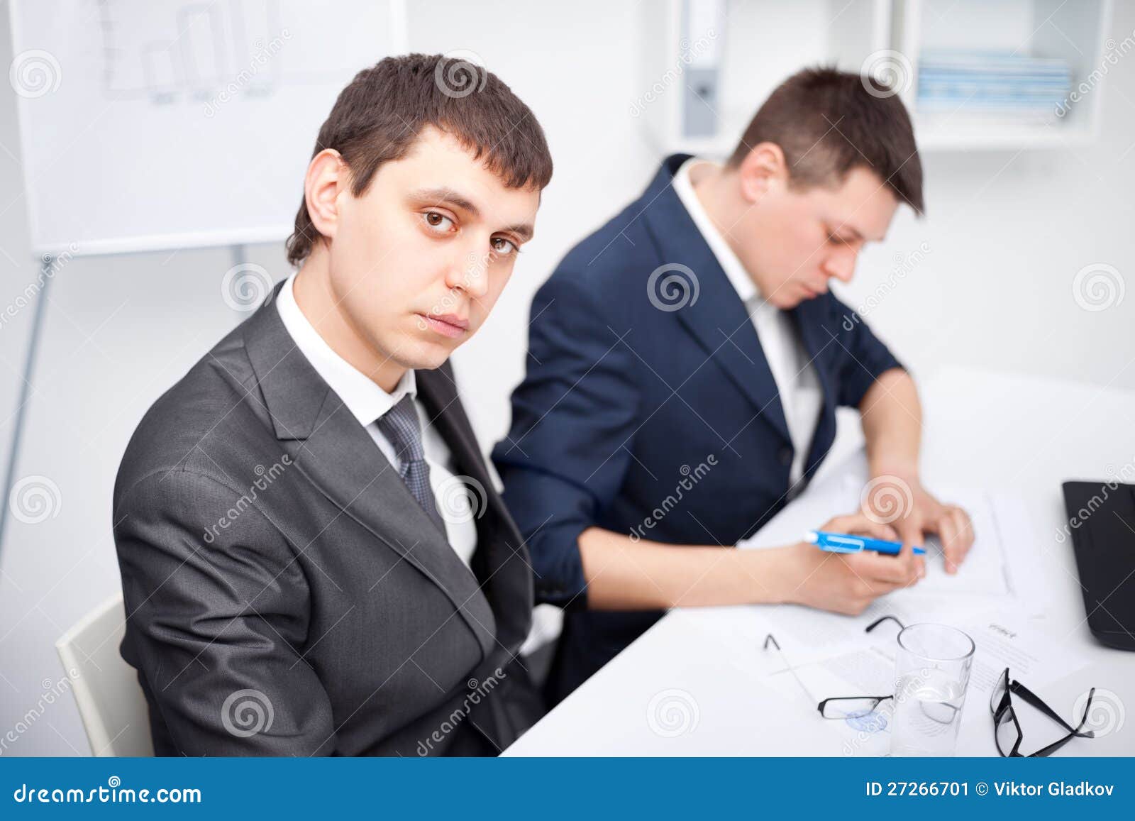 Two Young Businessmen Working in Office Stock Image - Image of ...