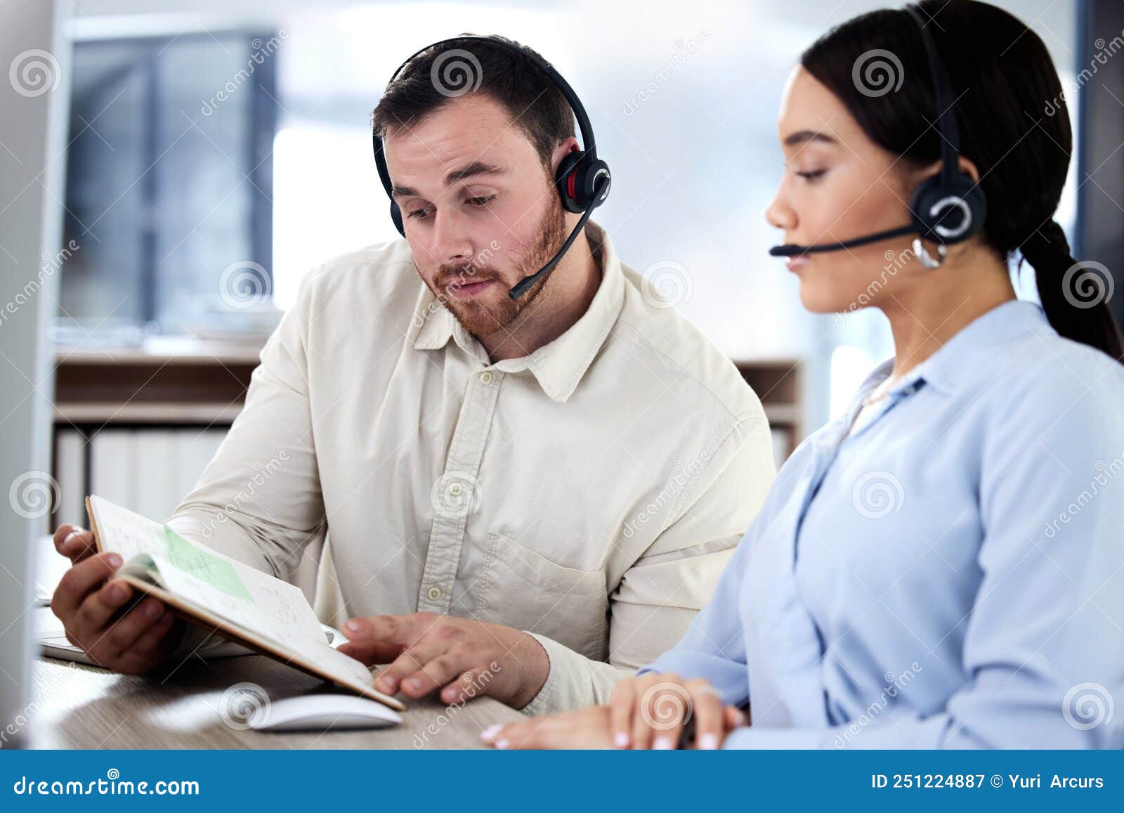 We really Need To Call this Client. Two Young Call Centre Agents ...