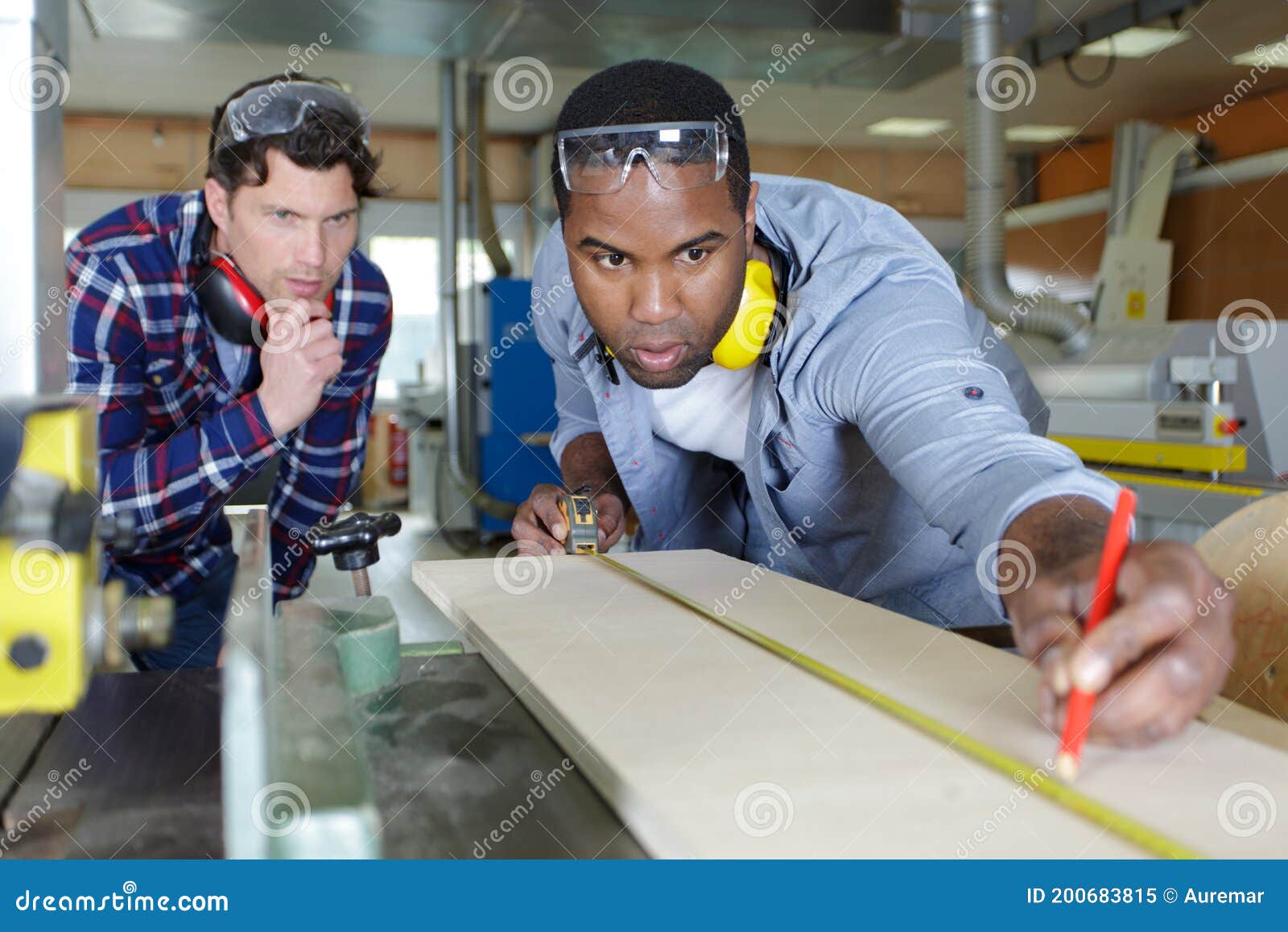 Two Young Carpenters Working in Shop Stock Image - Image of drawing ...