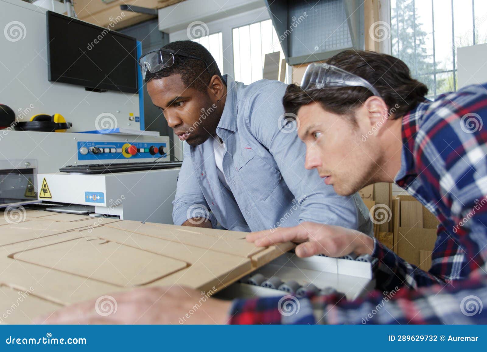 Two Young Carpenters Working in Shop Stock Photo - Image of taperuler ...