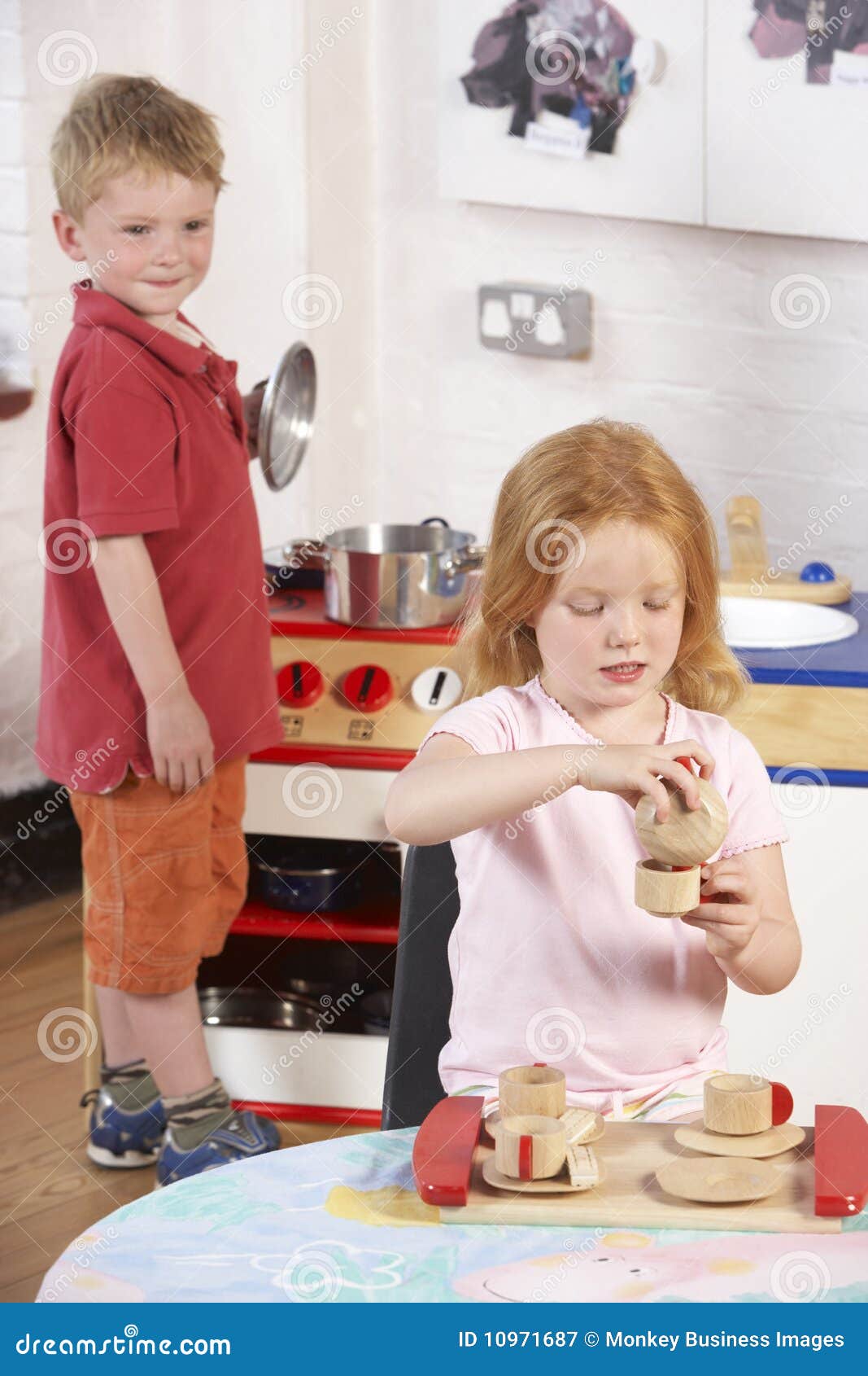 Two Young Children Playing Together At Montessori/ Royalty-Free Stock ...