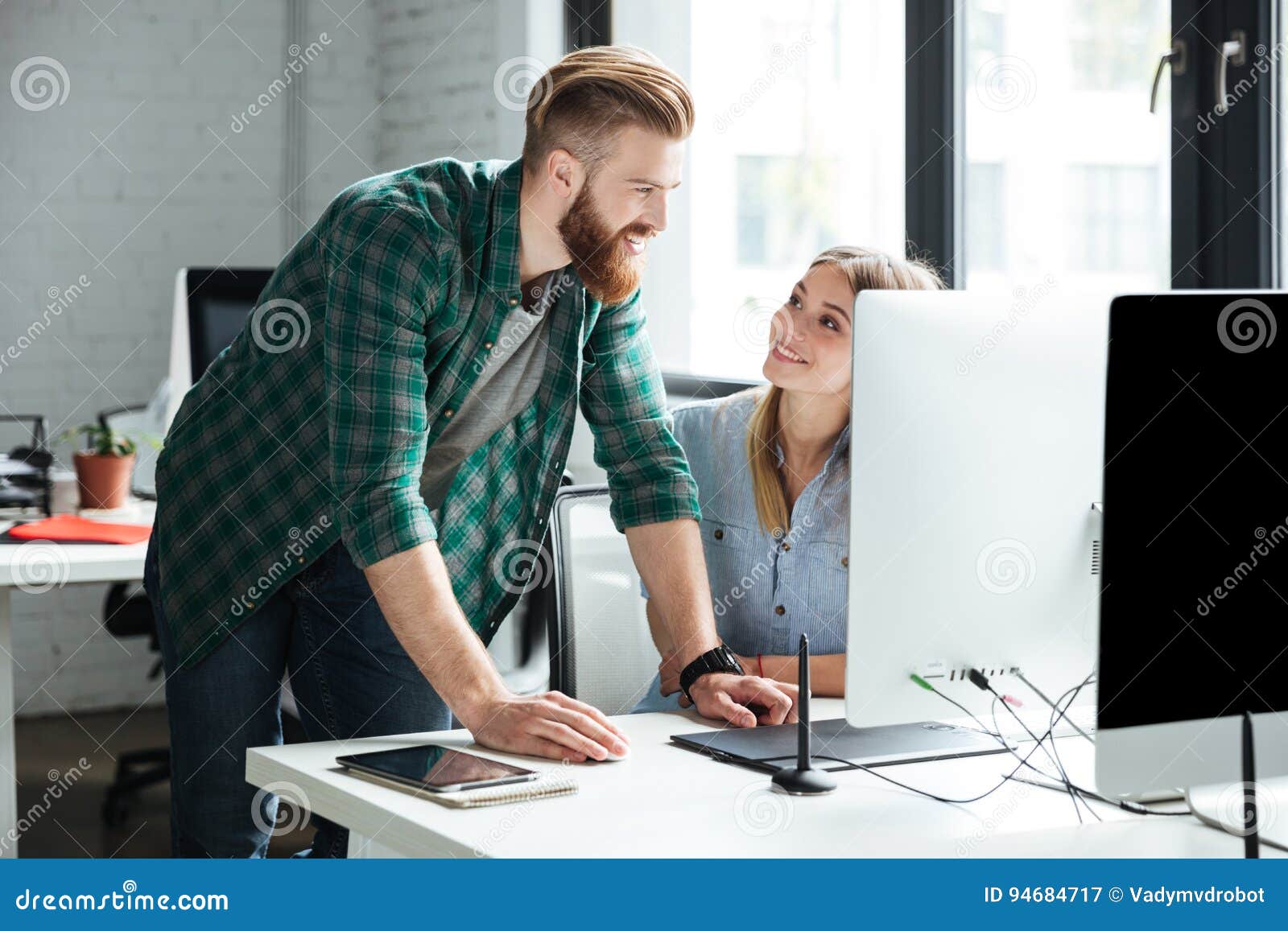 Two Young Concentrated Colleagues Work in Office Stock Image - Image of ...