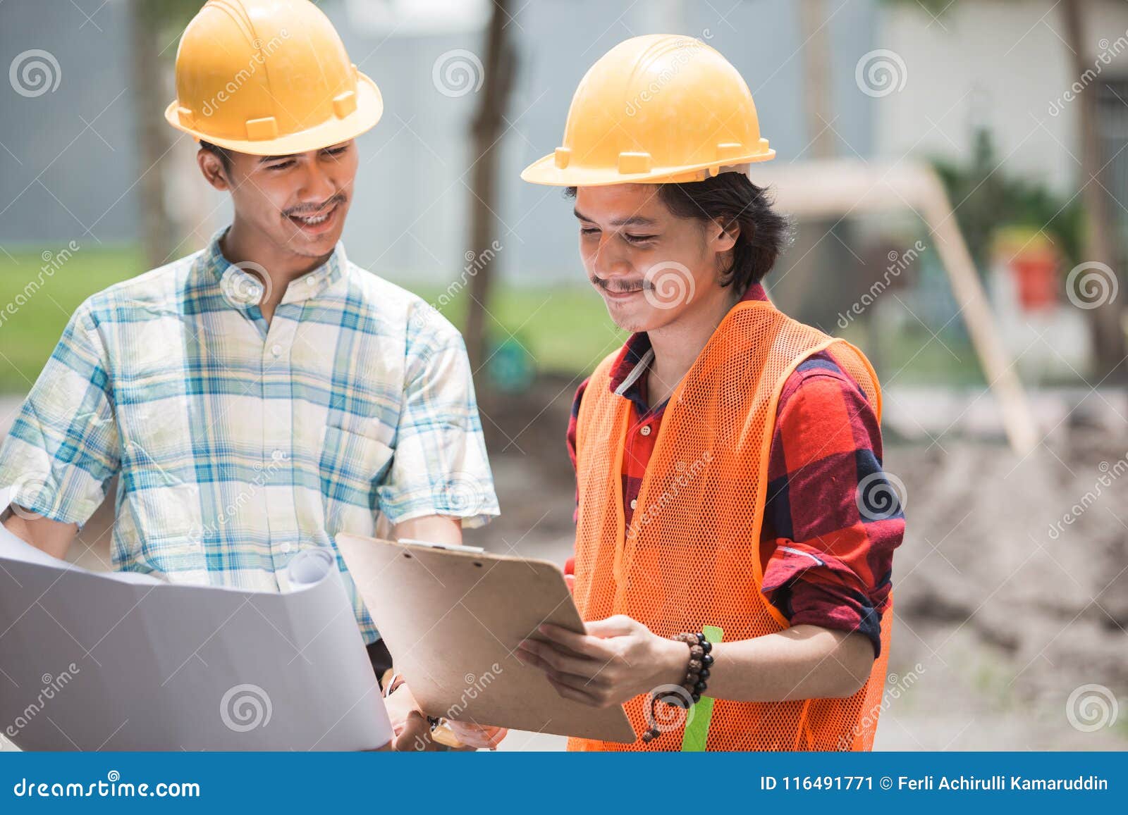 Two Construction Worker Standing in Front of the Building Site Stock ...