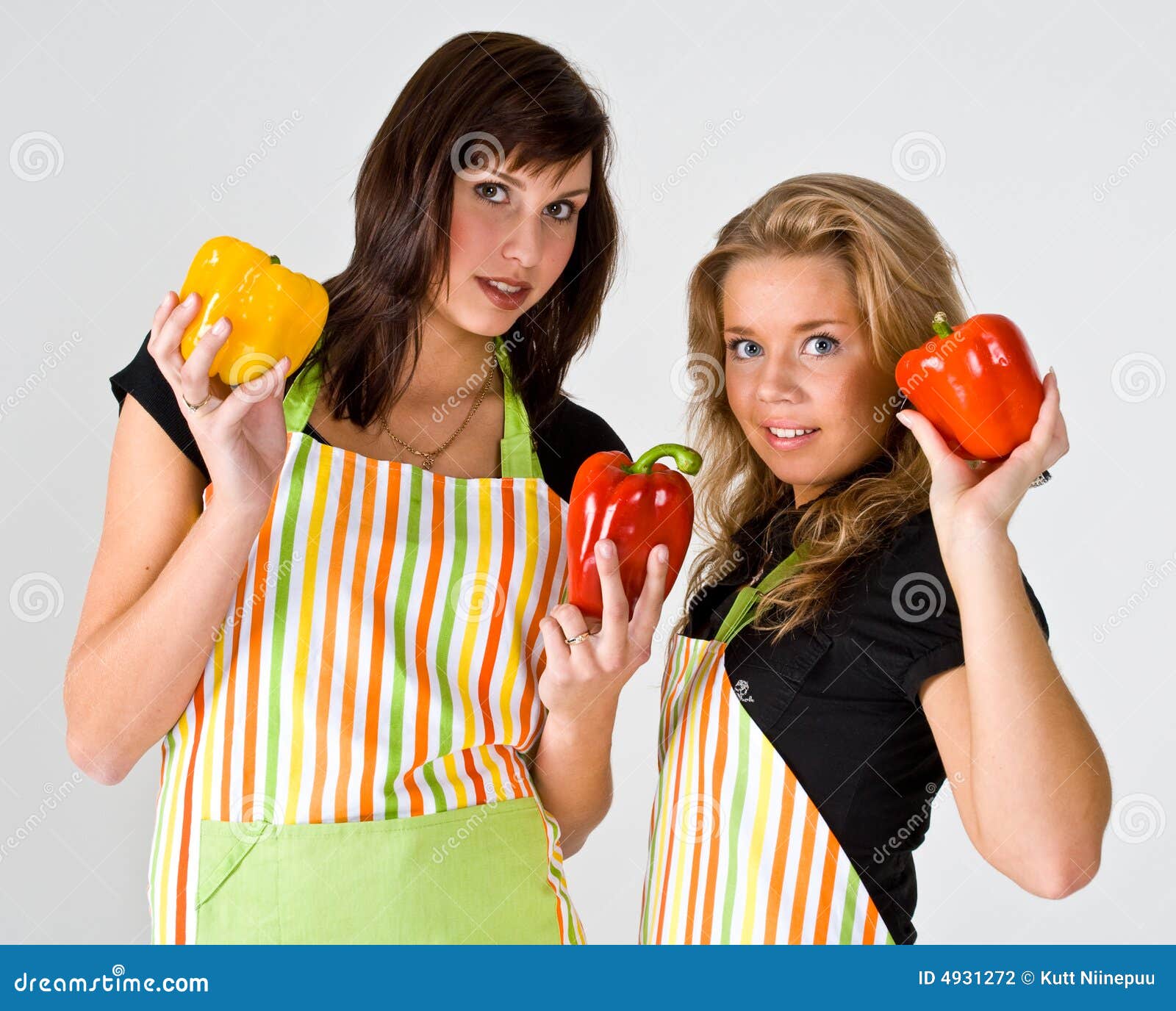Two Young Cooks with Peppers Stock Photo - Image of food, female: 4931272