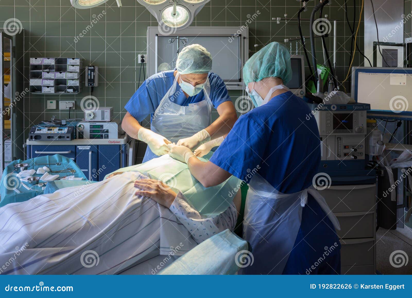 2 Young Doctors Perform an Operation in an Operating Theatre Editorial ...
