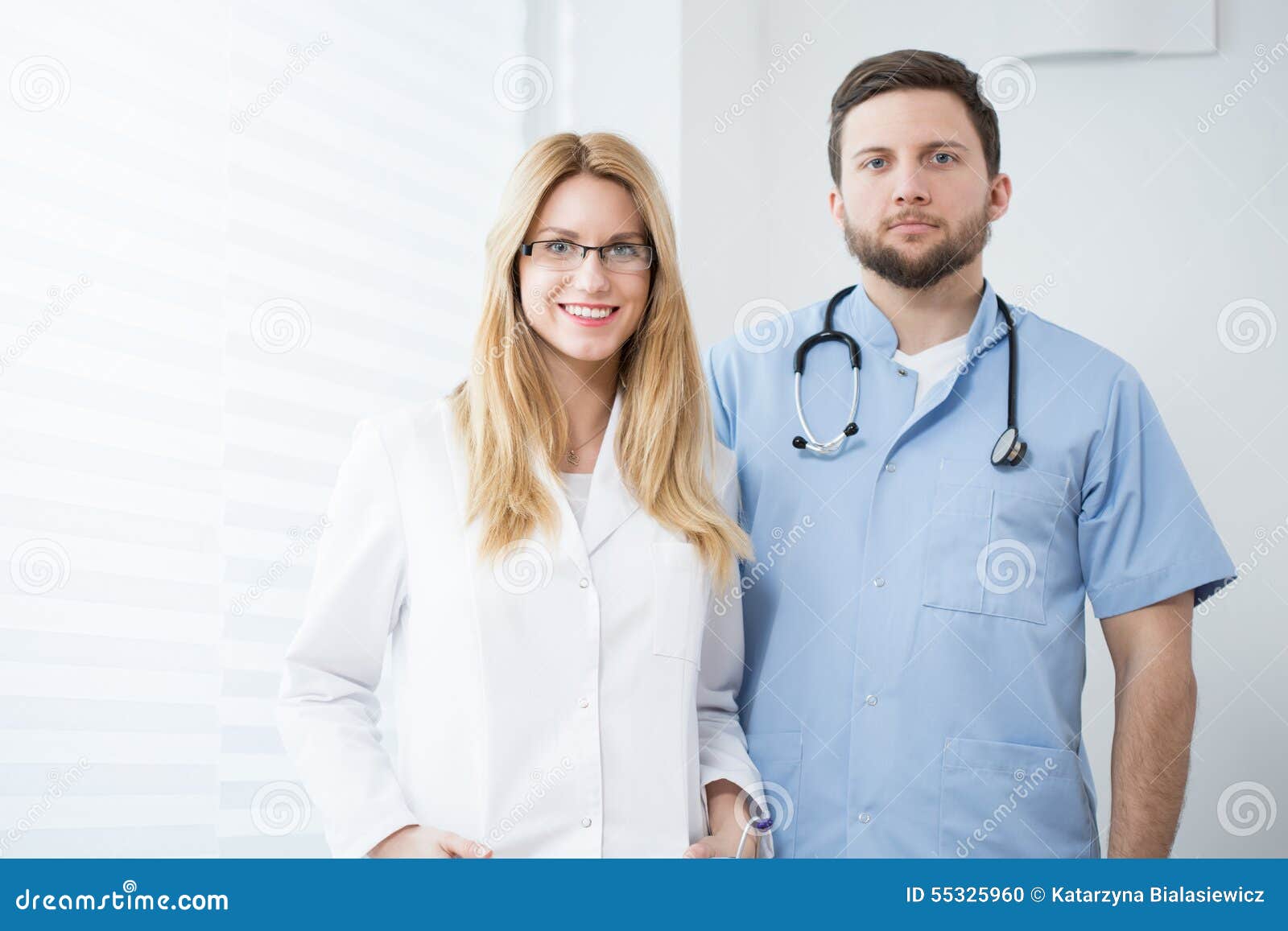 Two young doctors stock photo. Image of stethoscope, smiling - 55325960
