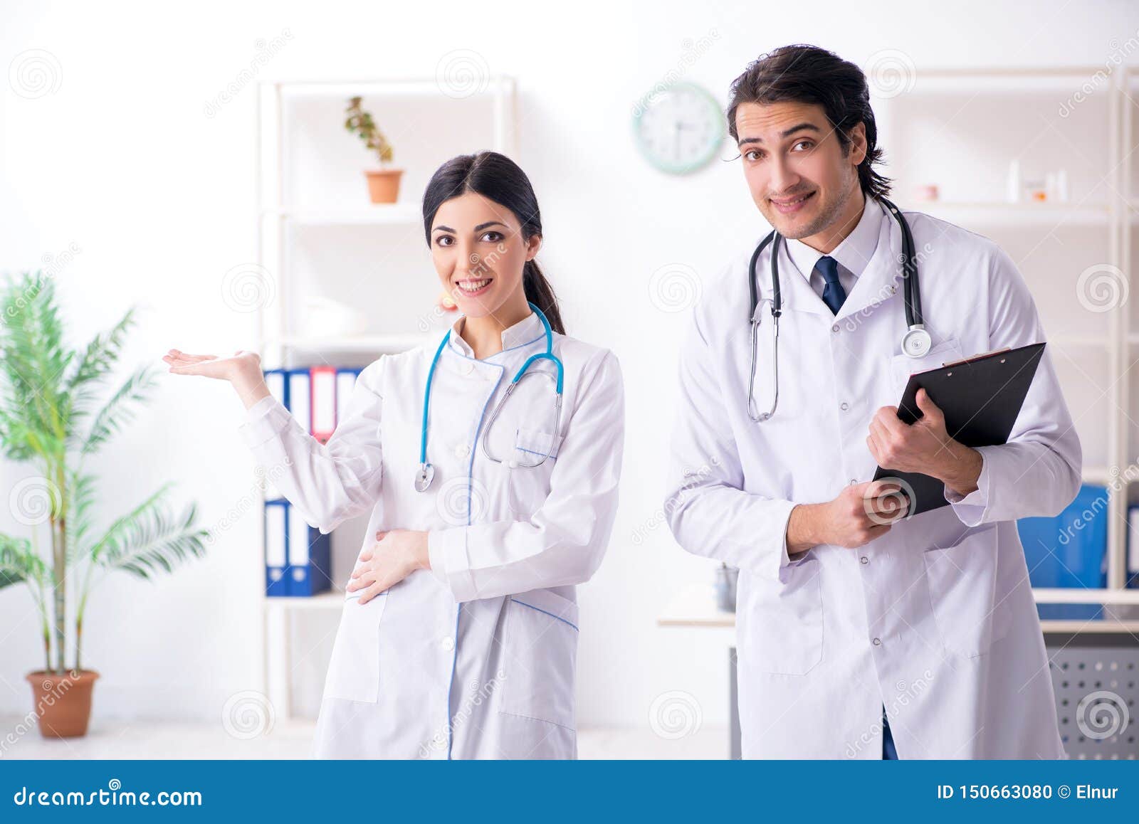 The Two Young Doctors Working in the Clinic Stock Photo - Image of ...