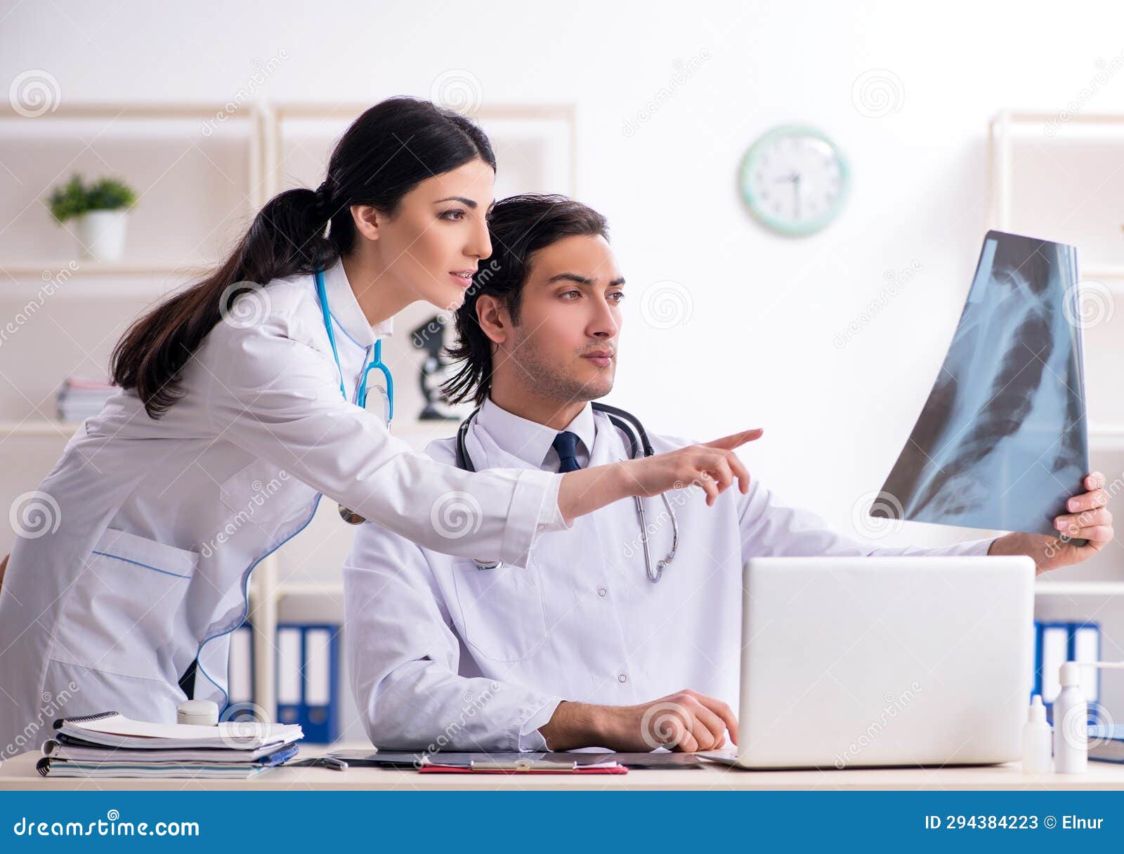 Two Young Doctors Working in the Clinic Stock Image - Image of care ...