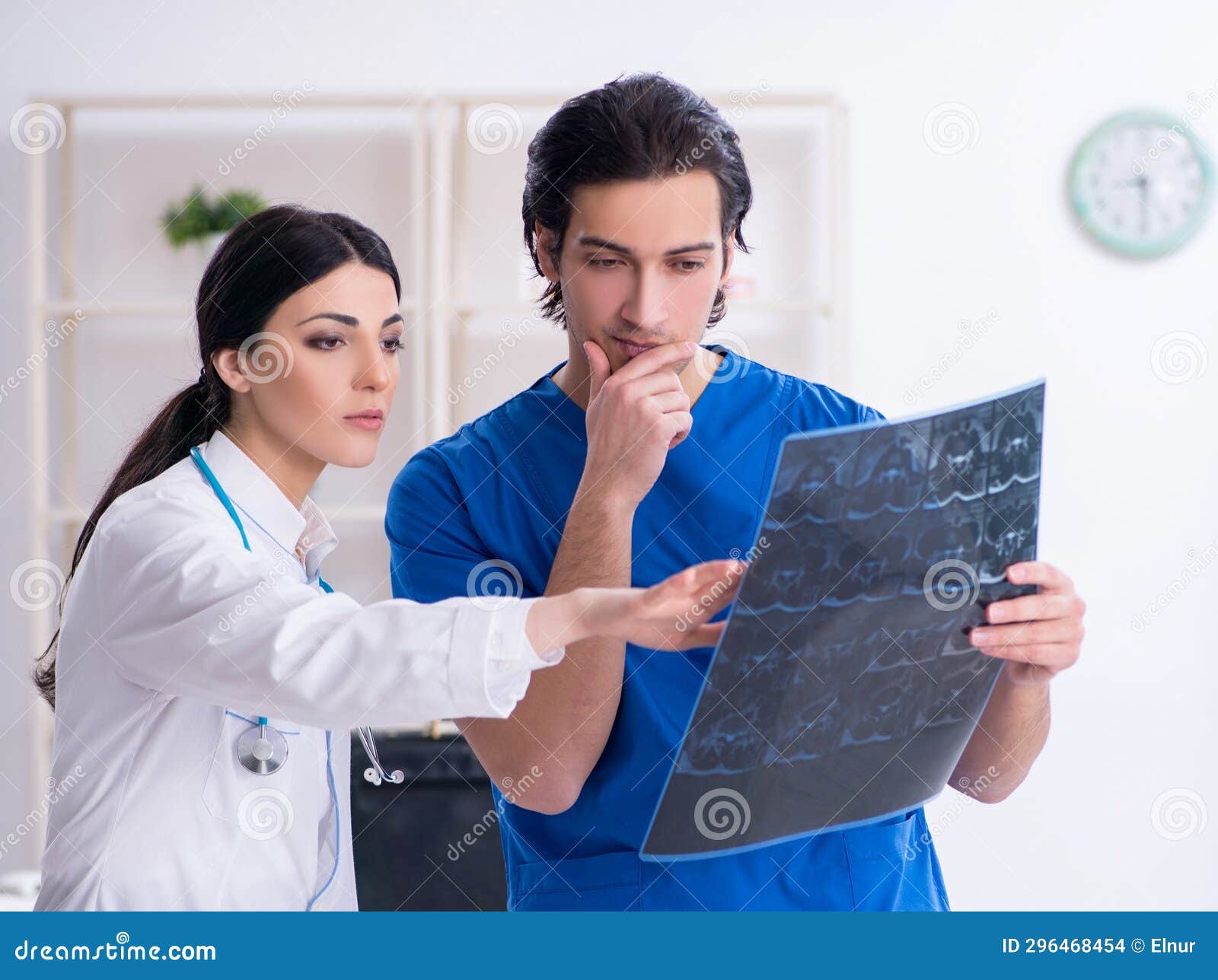 Two Young Doctors Working in the Clinic Stock Photo - Image of analysis ...