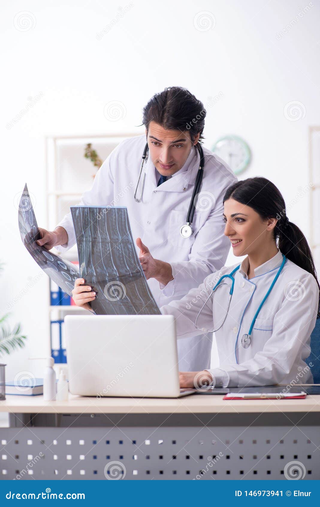 The Two Young Doctors Working in the Clinic Stock Image - Image of ...