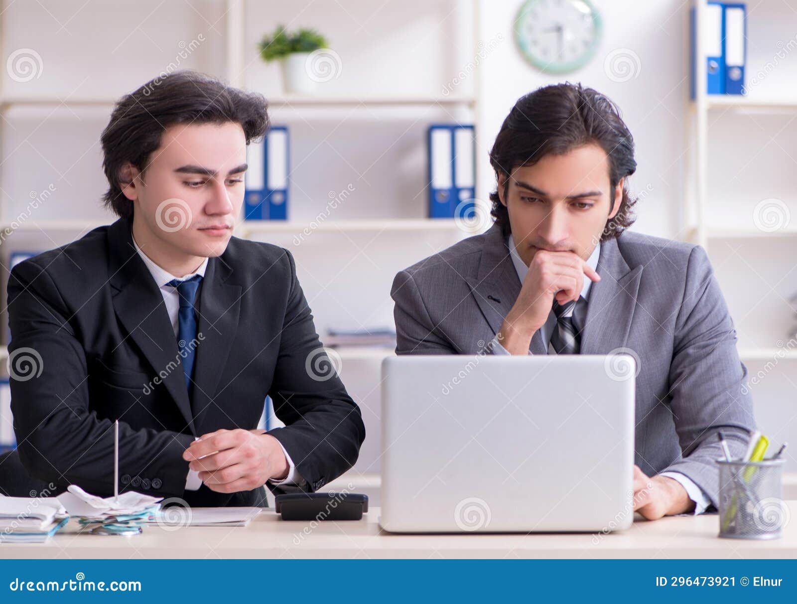 Two Young Employees Working in the Office Stock Image - Image of ...