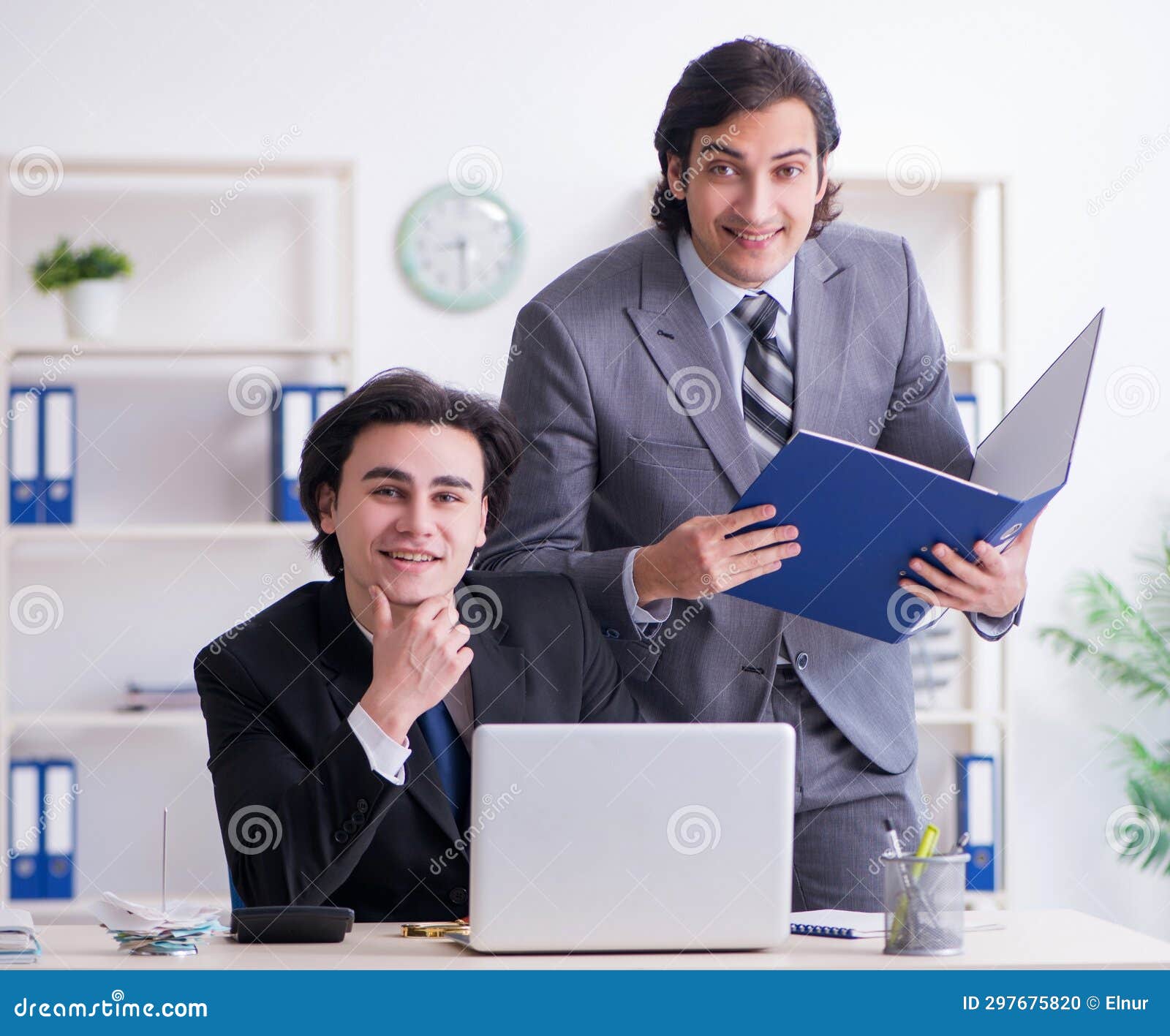 Two Young Employees Working in the Office Stock Photo - Image of ...