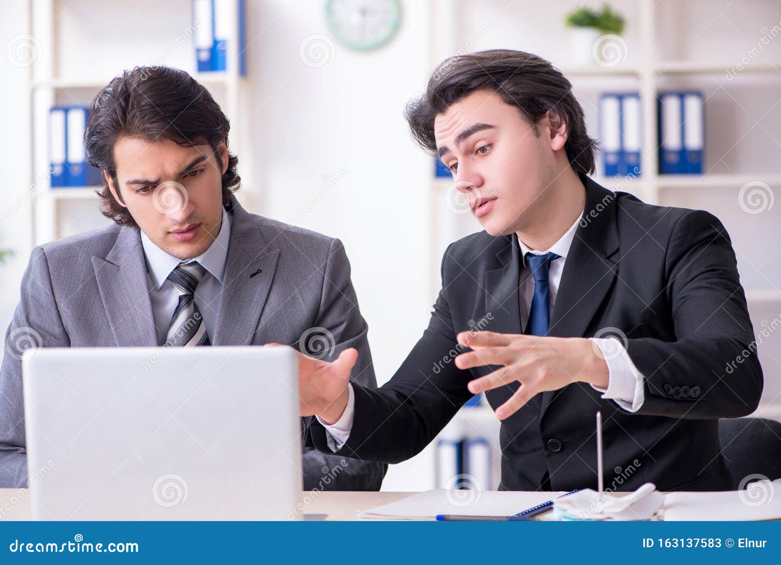 Two Young Employees Working in the Office Stock Image - Image of ...