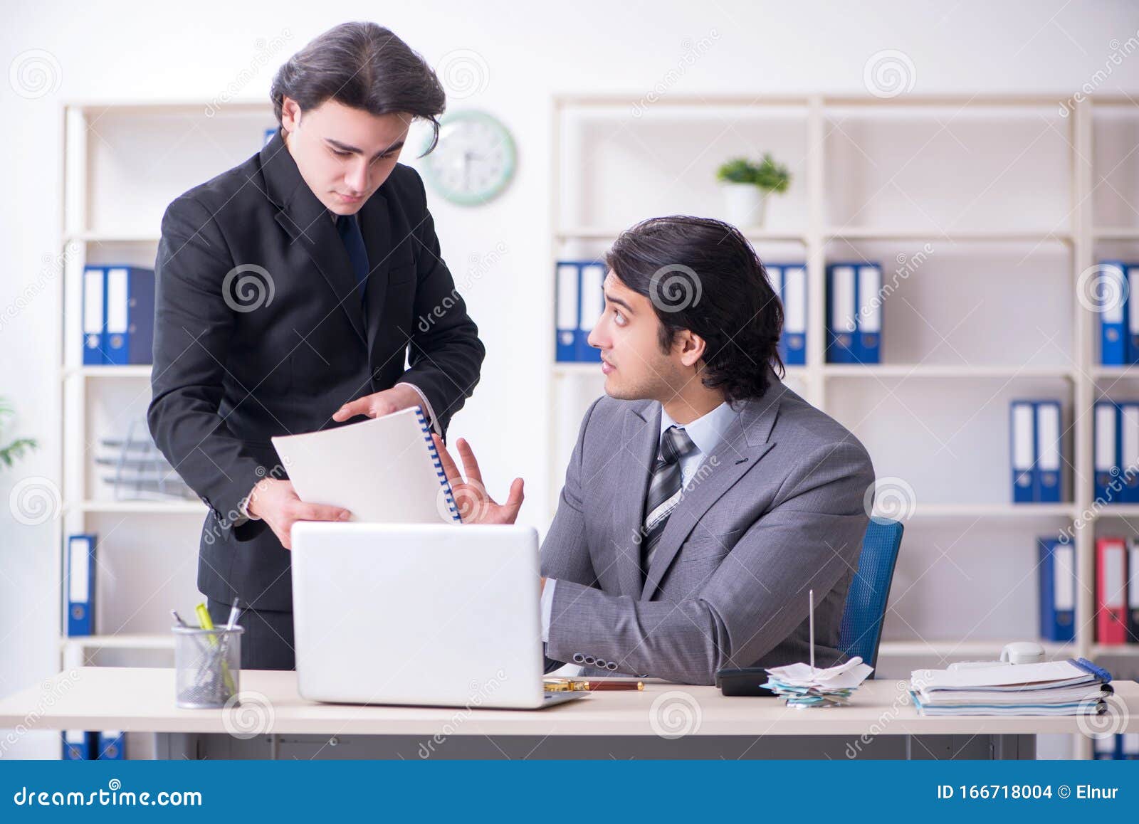 Two Young Employees Working in the Office Stock Photo - Image of ...