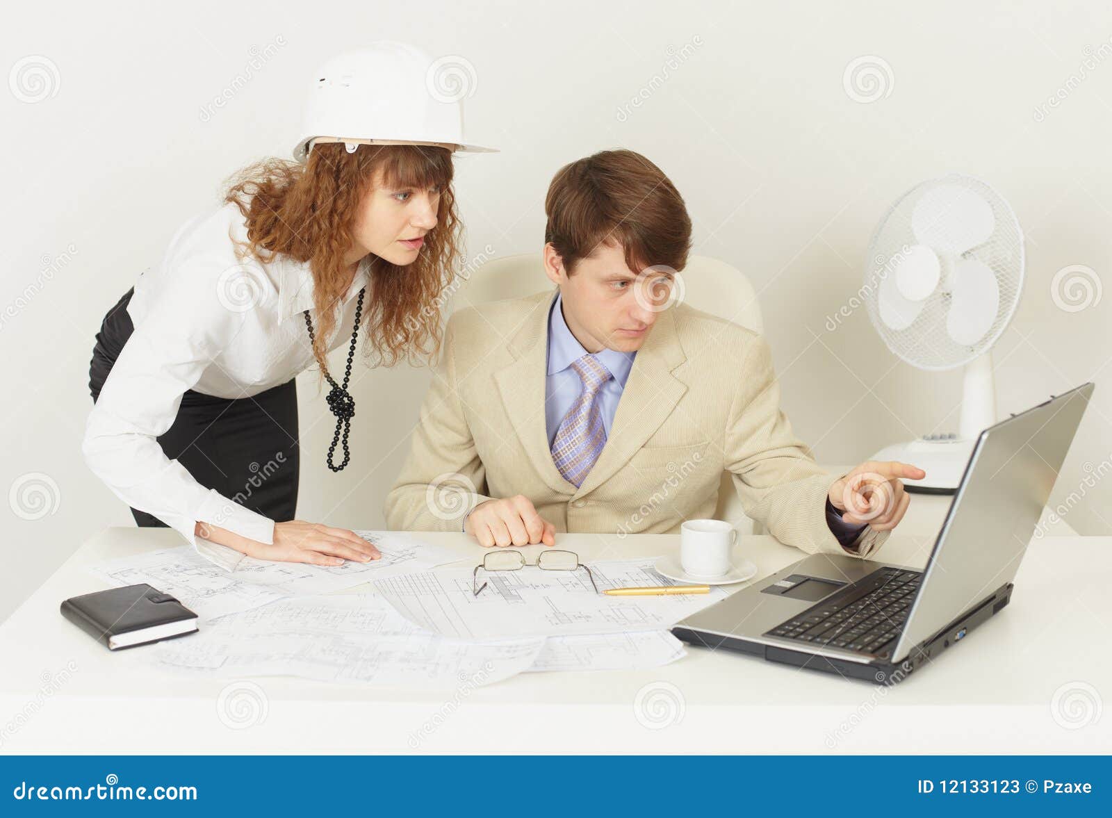 Two Young Engineers Work Over Project on Laptop Stock Image - Image of ...