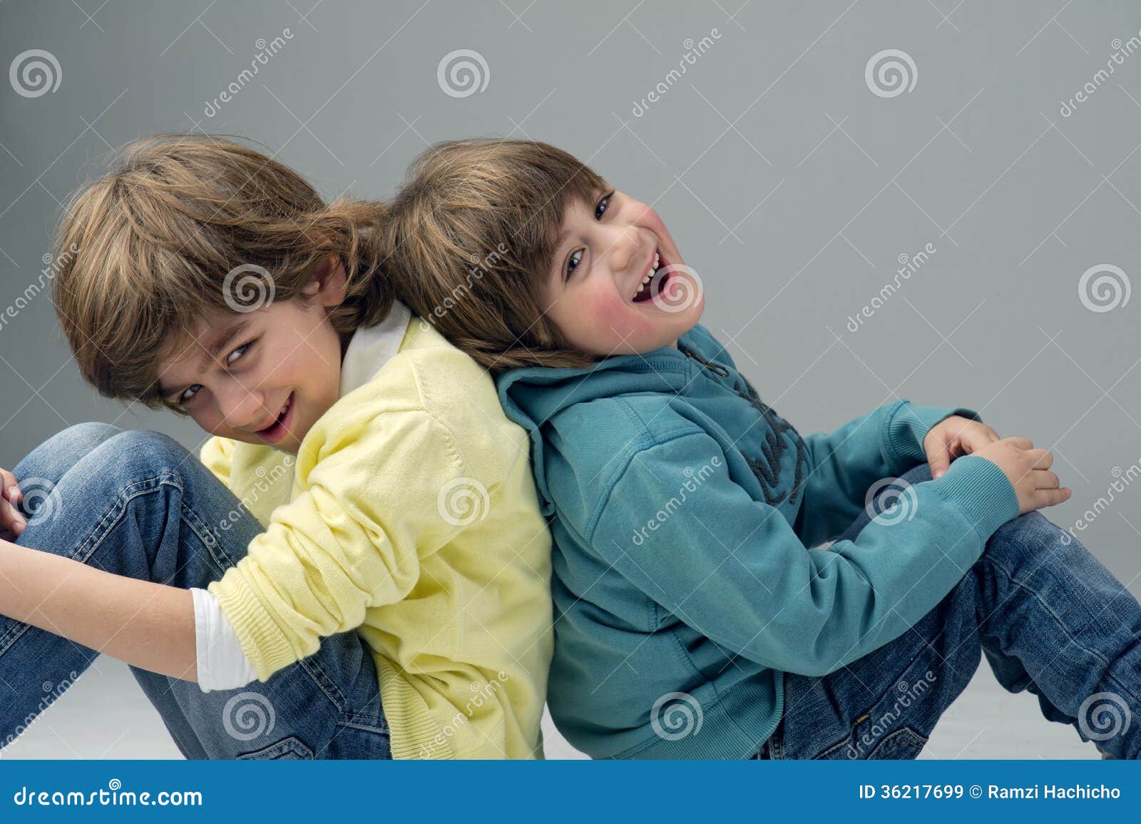 Two Young Fashionable Brothers Having Fun Stock Image - Image of ...