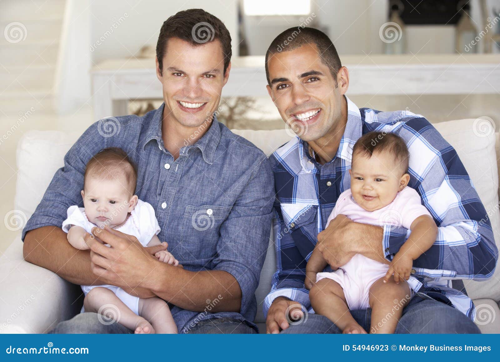 Two Young Fathers on Sofa at Home Stock Image - Image of beautiful ...