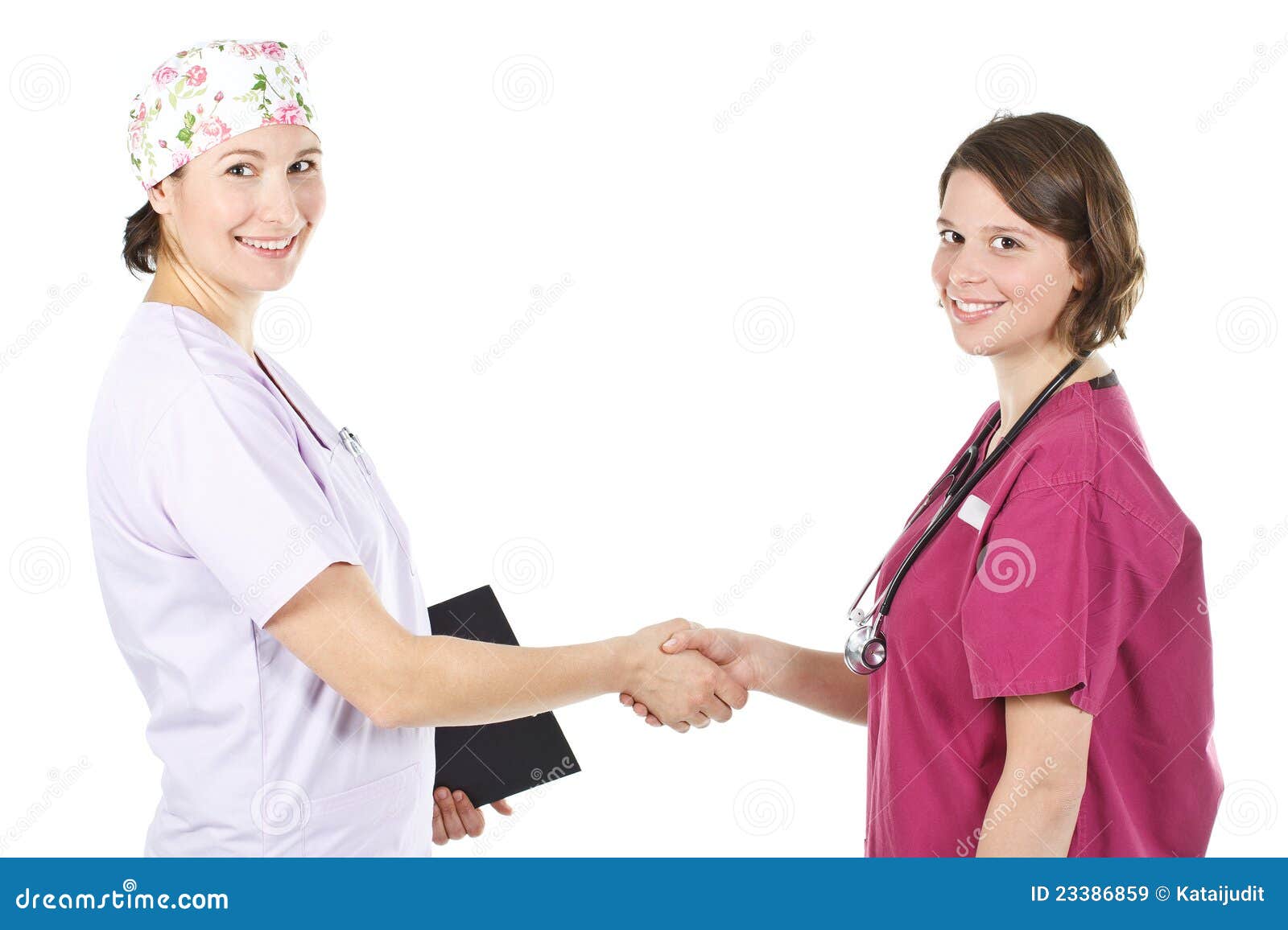 Two Young Female Doctors Shaking Hands Stock Image - Image of hospital ...