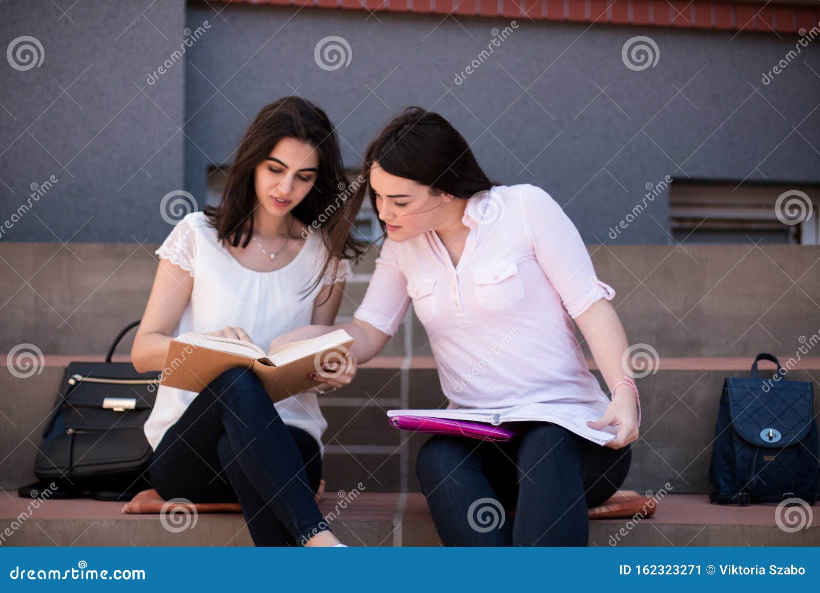 Two Young Female Students Outdoors on the Campus Stock Image - Image of ...