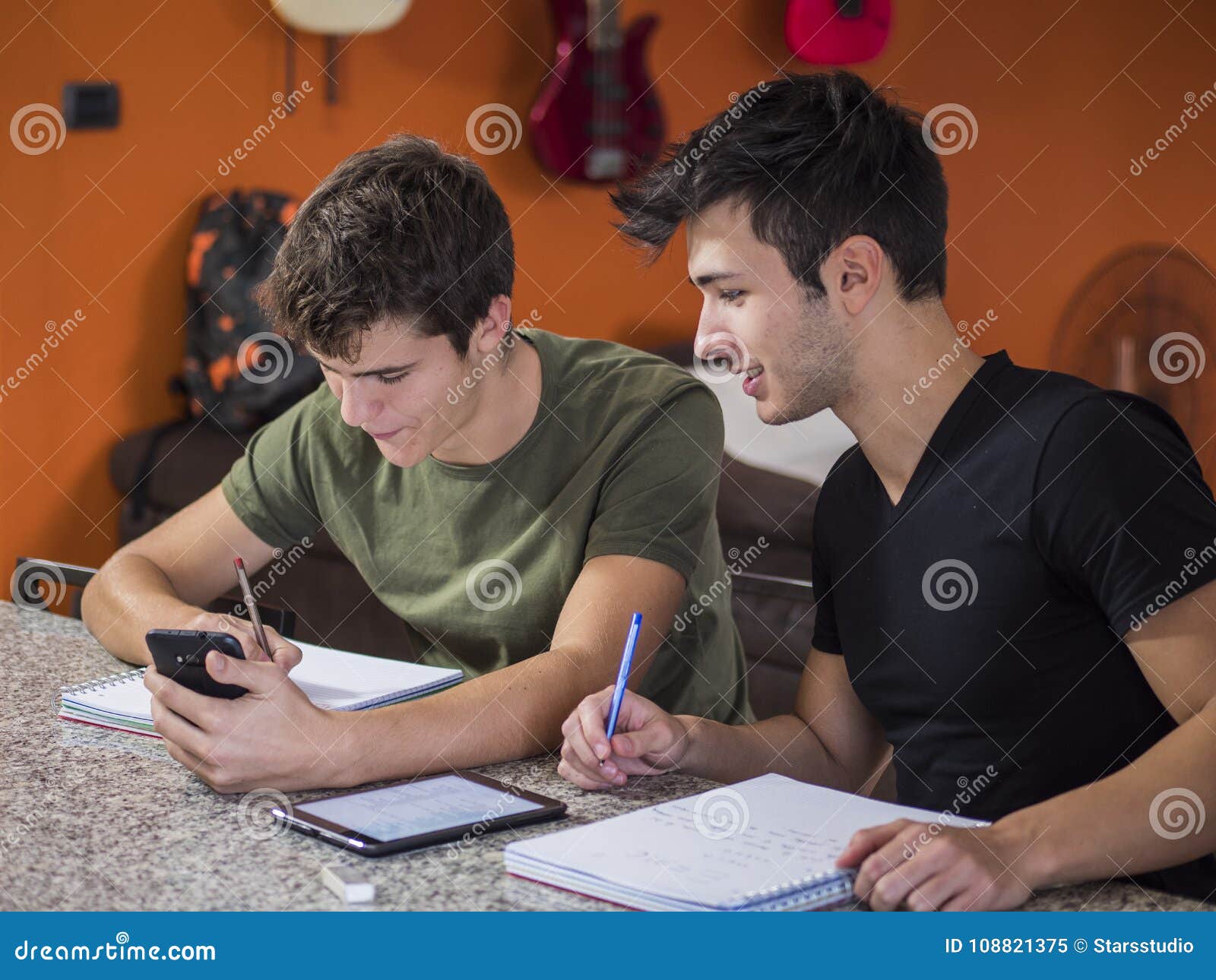 Young Men Busy with Studies Stock Image - Image of male, notepad: 108821375