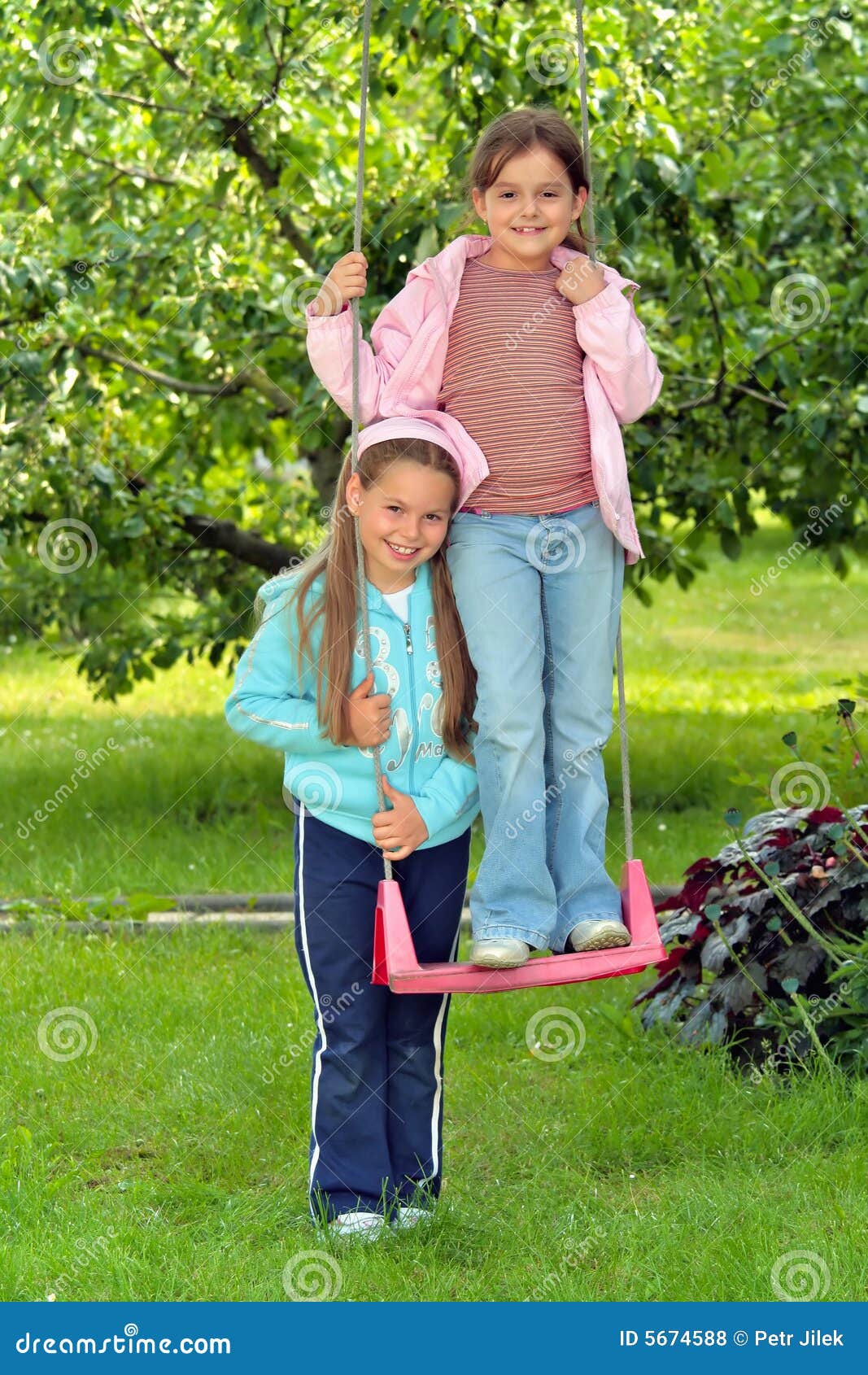 Two young girls stock photo. Image of laughing, nature - 5674588
