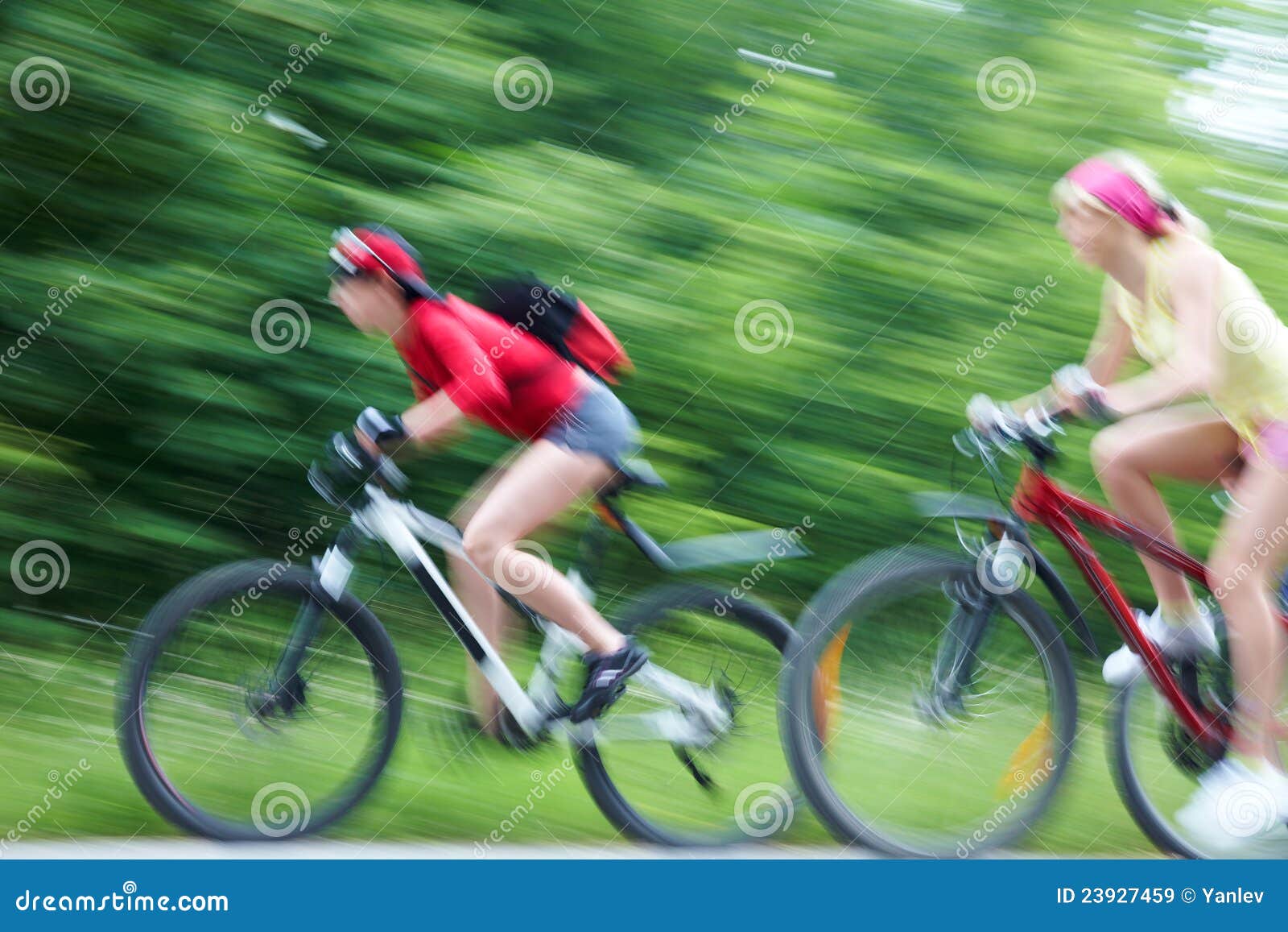 Two young girls on bicycle stock image. Image of relaxation - 23927459