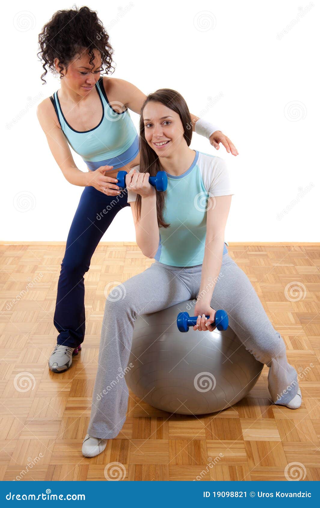 Two Young Girls, Exercising Together with Weights Stock Image - Image ...