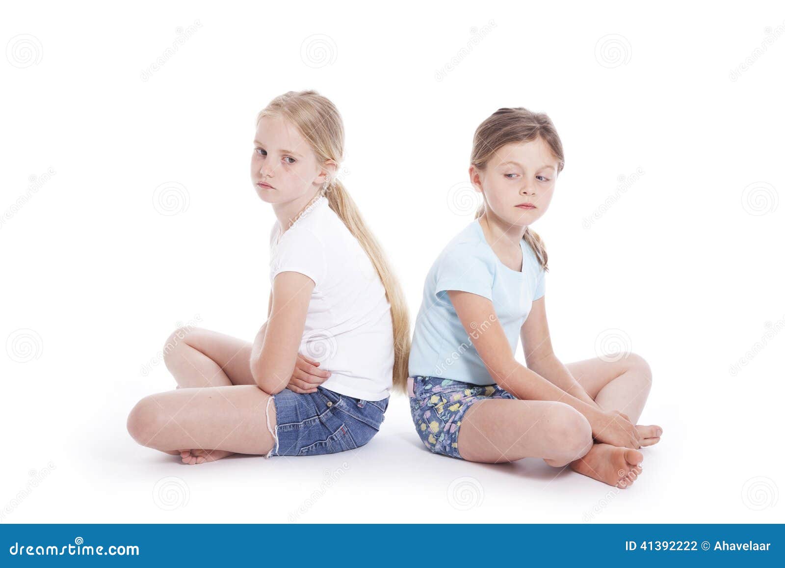 Two Young Girls Having a Disagreement Stock Photo - Image of grumpy ...