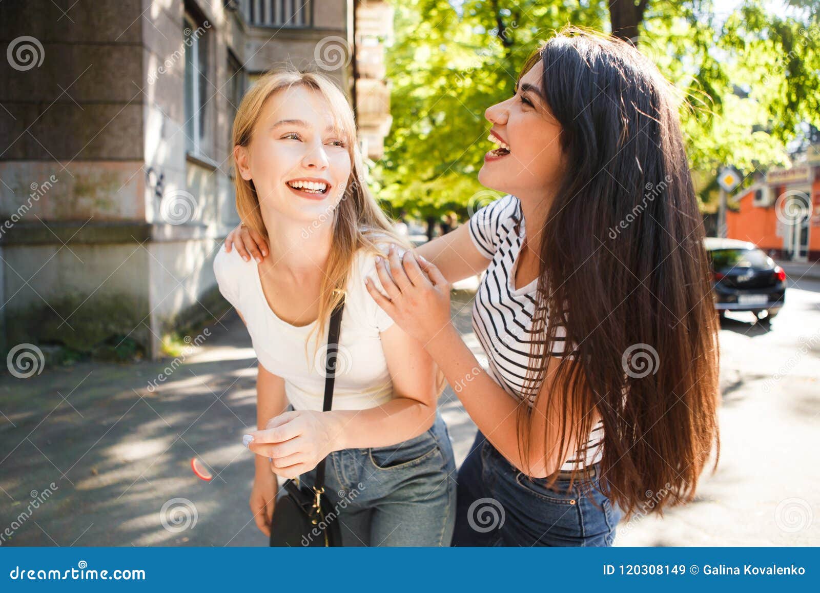 Two Young Girls Hug And Laugh Stock Image Image Of Cool People