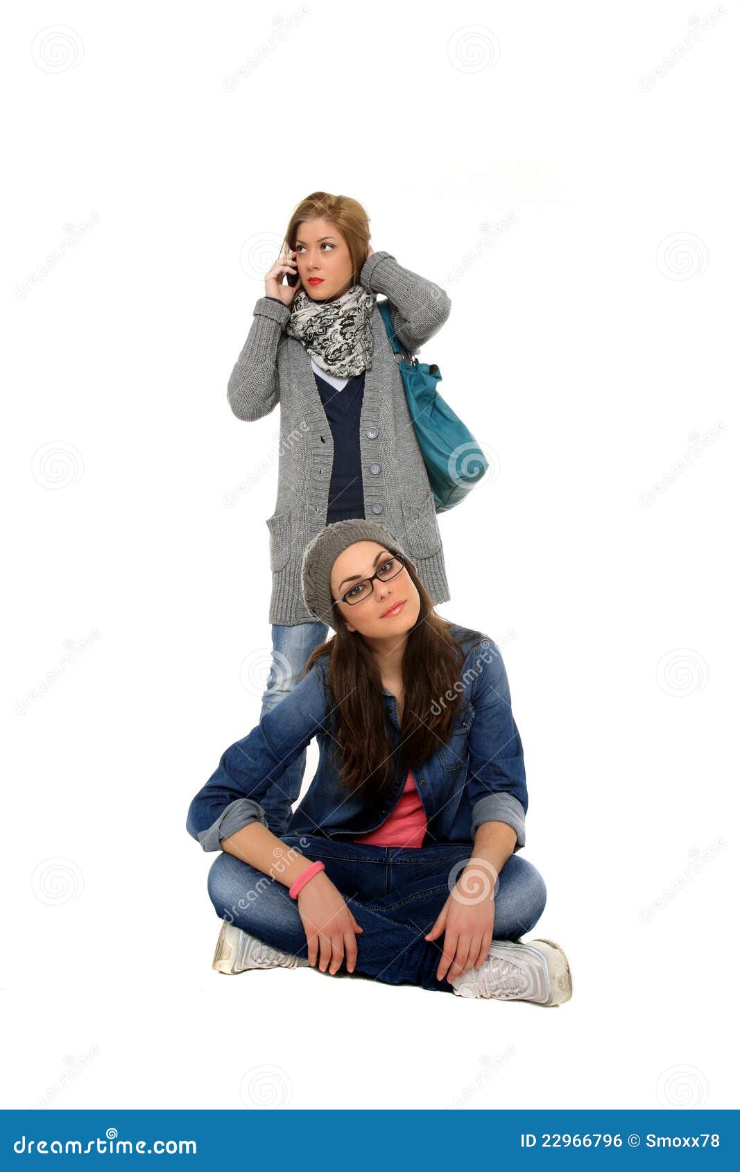 Two Young Girls Making a Phone Call Stock Photo - Image of pose, hands ...