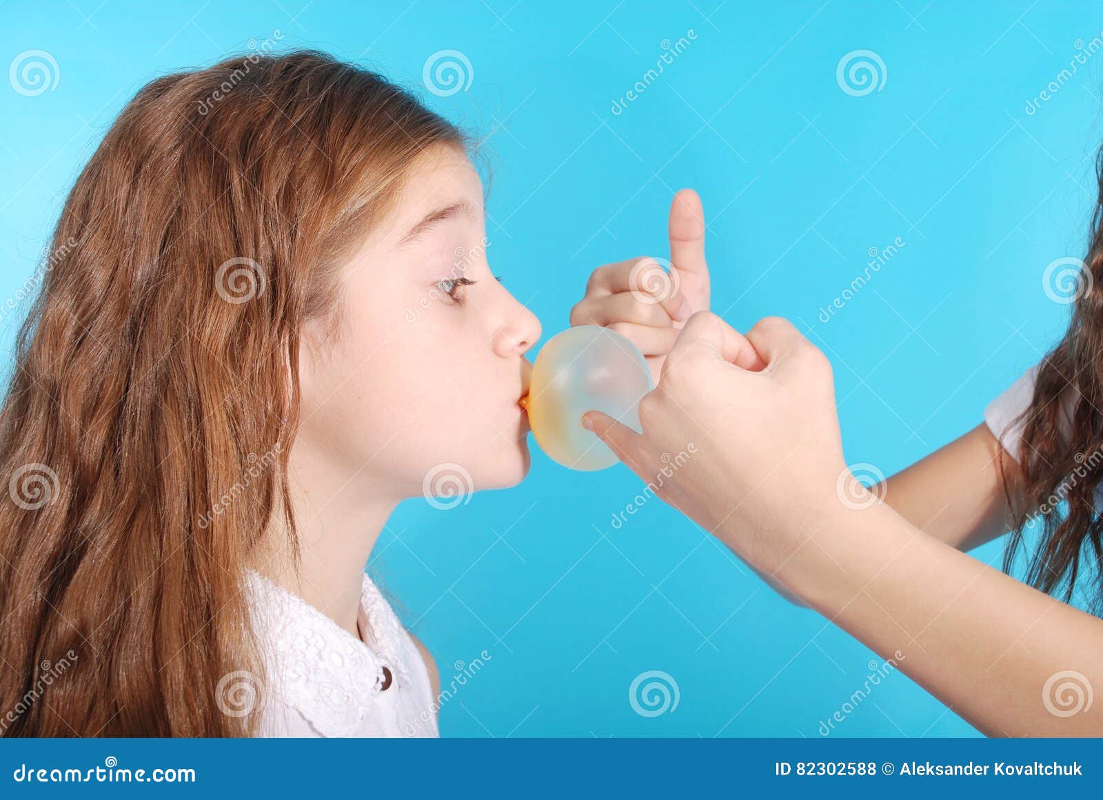 Two Young Girls Playing with Chewing Gum Stock Photo - Image of ...