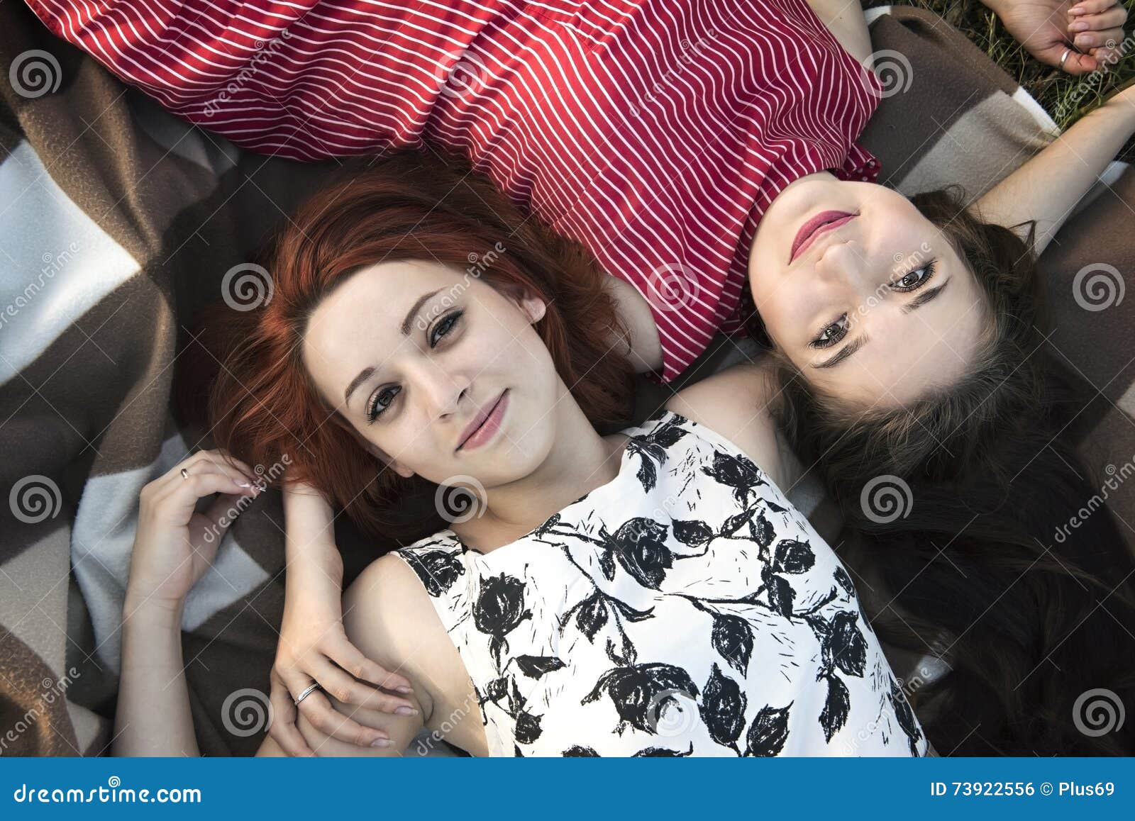 Two Young Girls on a Rest Outdoors Stock Photo - Image of girl ...