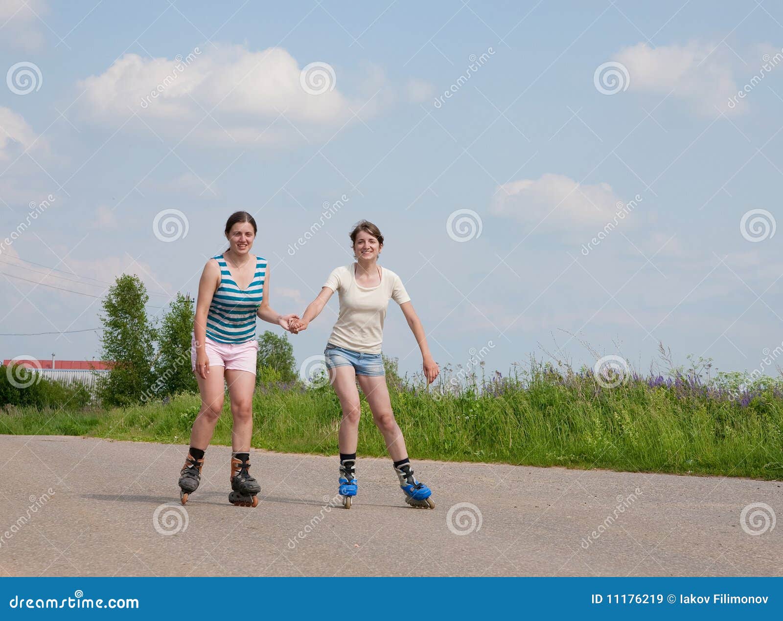 Two Young Girls on Roller Blades Stock Image - Image of asphal, sport ...