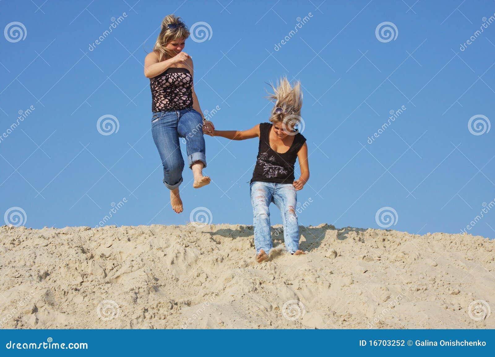 Two Young Girls on a Sand-pit Stock Photo - Image of merry, glasses ...