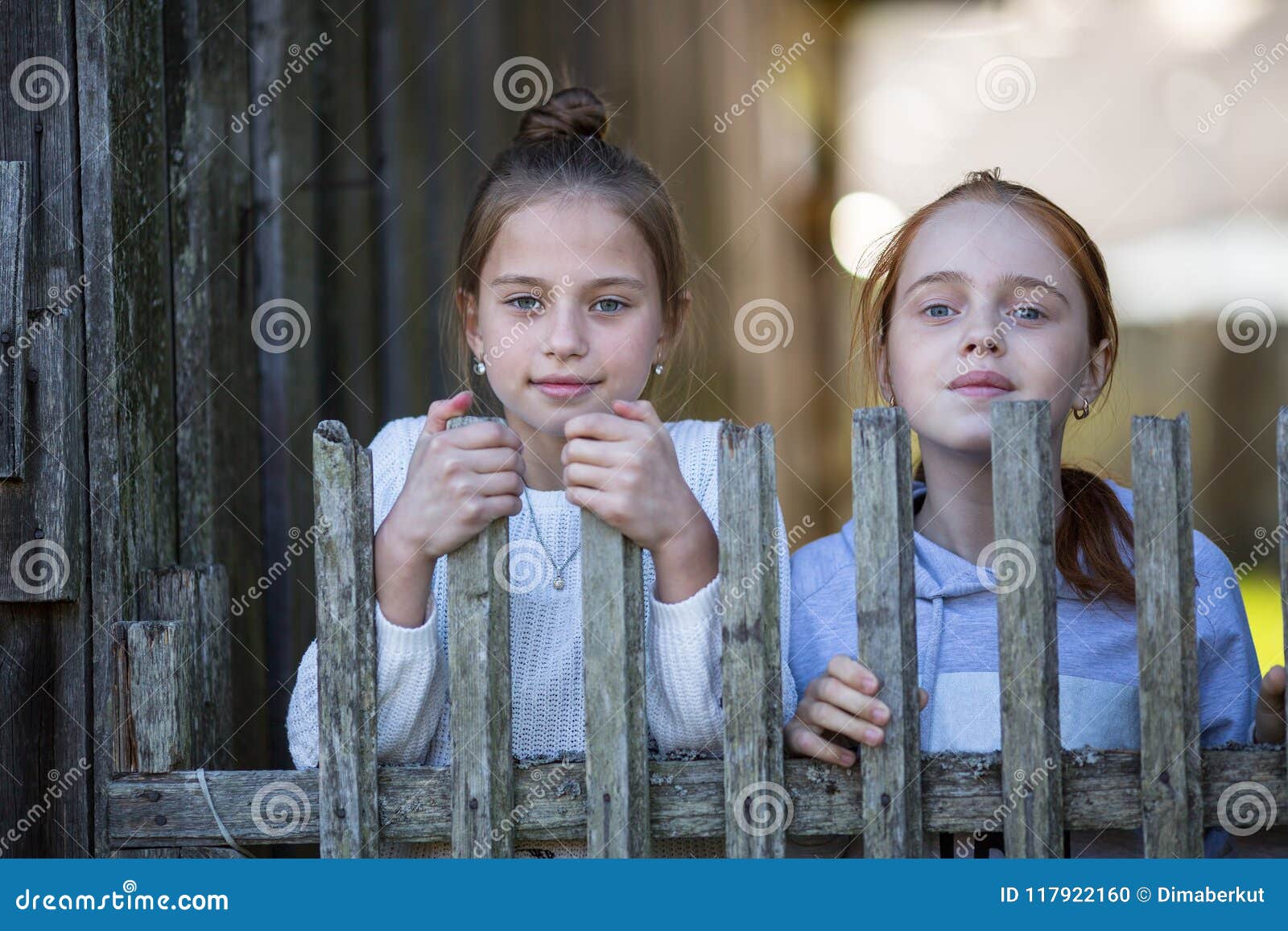 Two Young Girls Sisters Outdoors. Stock Photo - Image of freedom ... Two Young Girls Sisters Outdoors. Stock Photo - Image of freedom ...