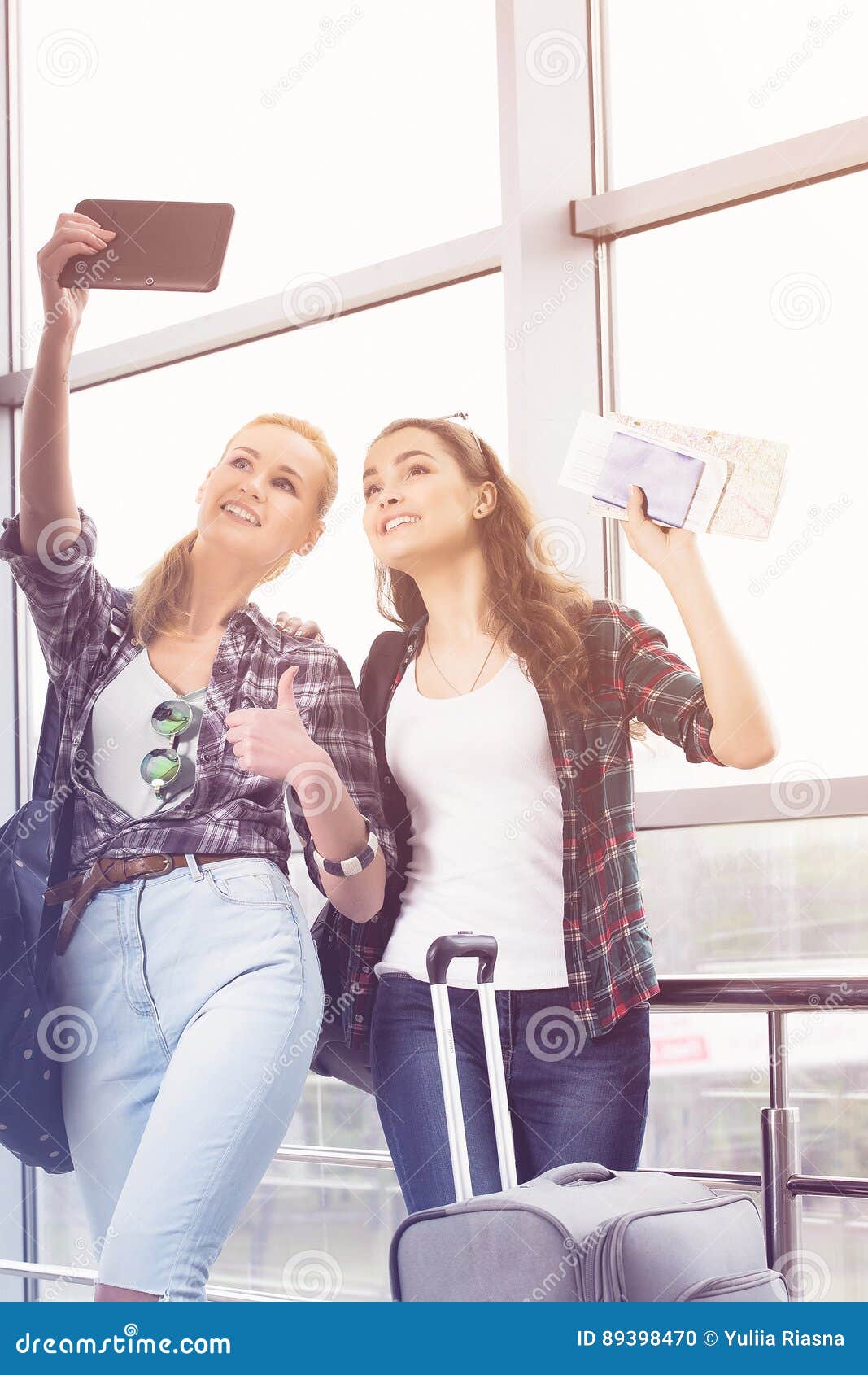 Two Young Girls in Sunglasses Doing Selfie on the Computer Tablet Stock ...