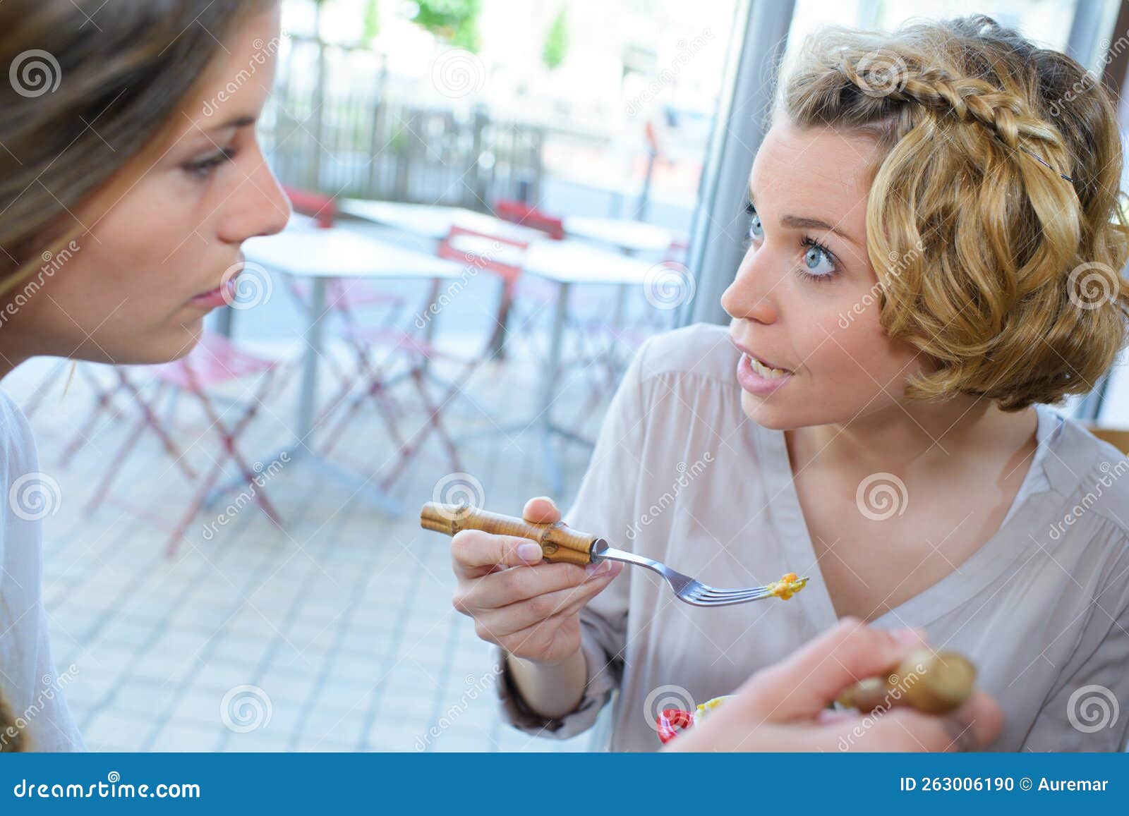 Two Young Girls Talking and Smiling during Lunch Break Stock Photo ...