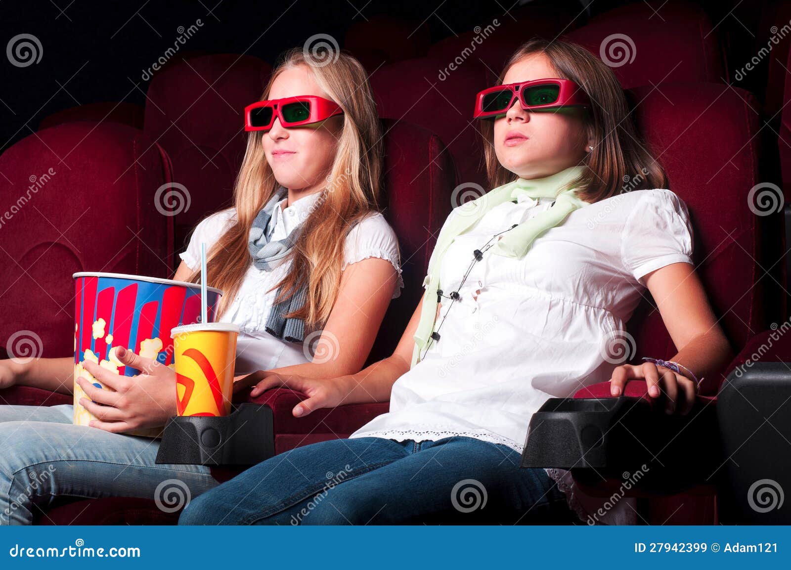 Two Young Girls Watching in Cinema Stock Image - Image of entertaining ...