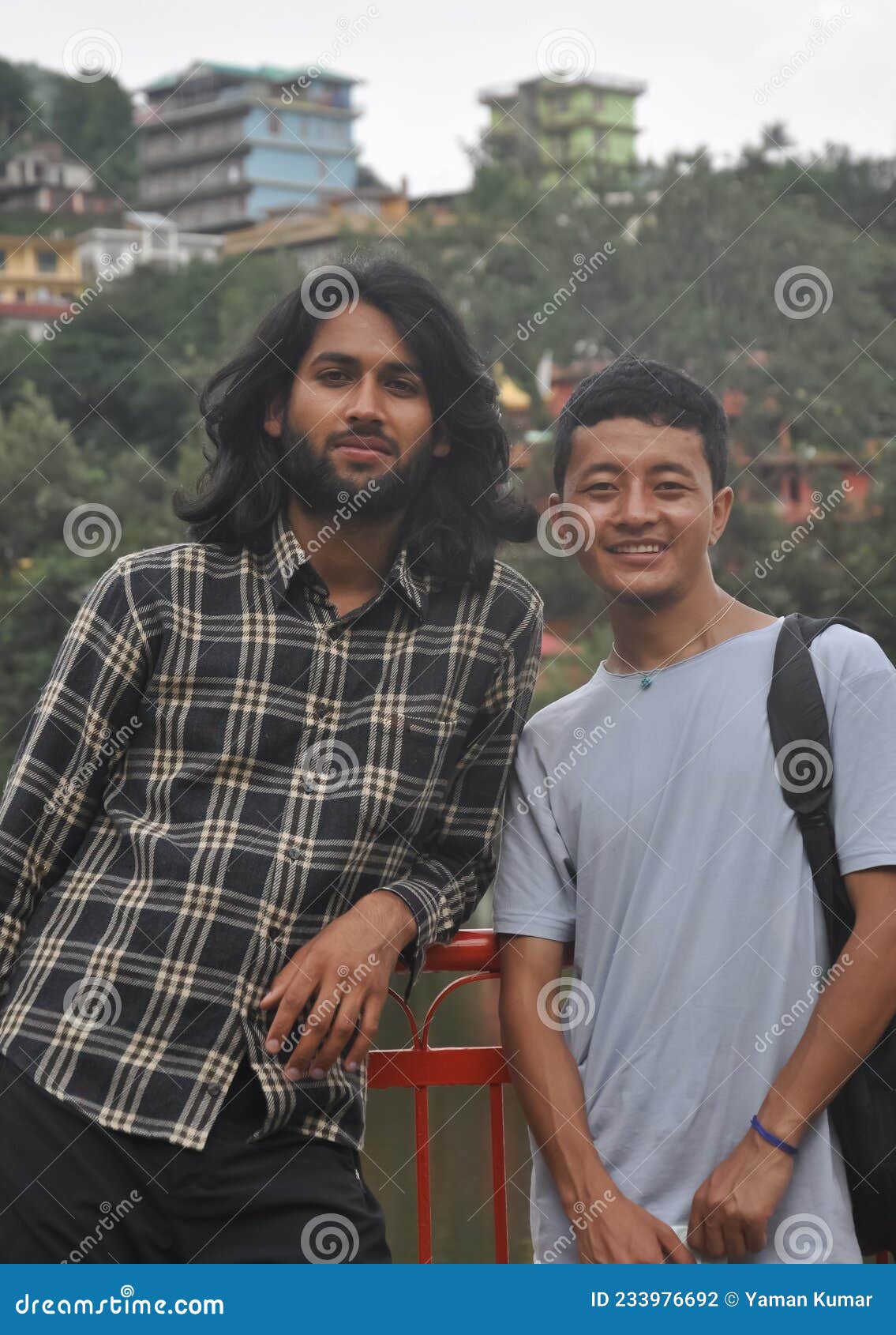 Two Young Guys Posing for Photo in Outside with Looking at Camera Stock ...