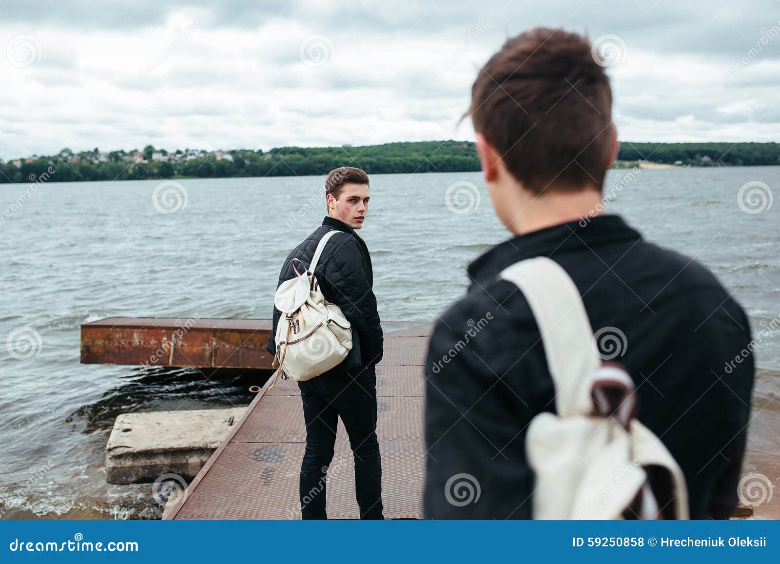 Two Young Guys Standing on a Pier Stock Photo - Image of peaceful, lake ... Two Young Guys Standing on a Pier Stock Photo - Image of peaceful, lake ...