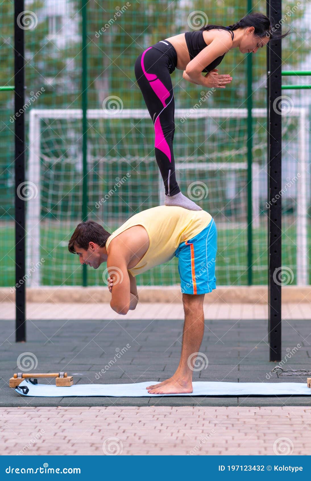 Two Young Gymnasts Doing a Training Workout Stock Photo - Image of ...