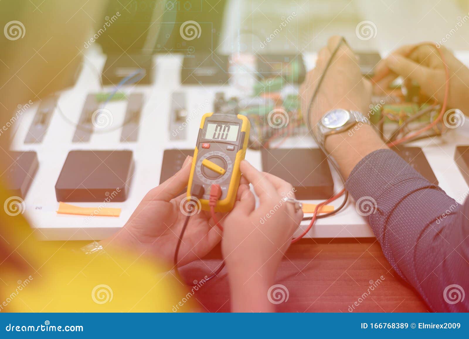 Two Young Handsome Engineers Working on Electronics Components.Tech ...