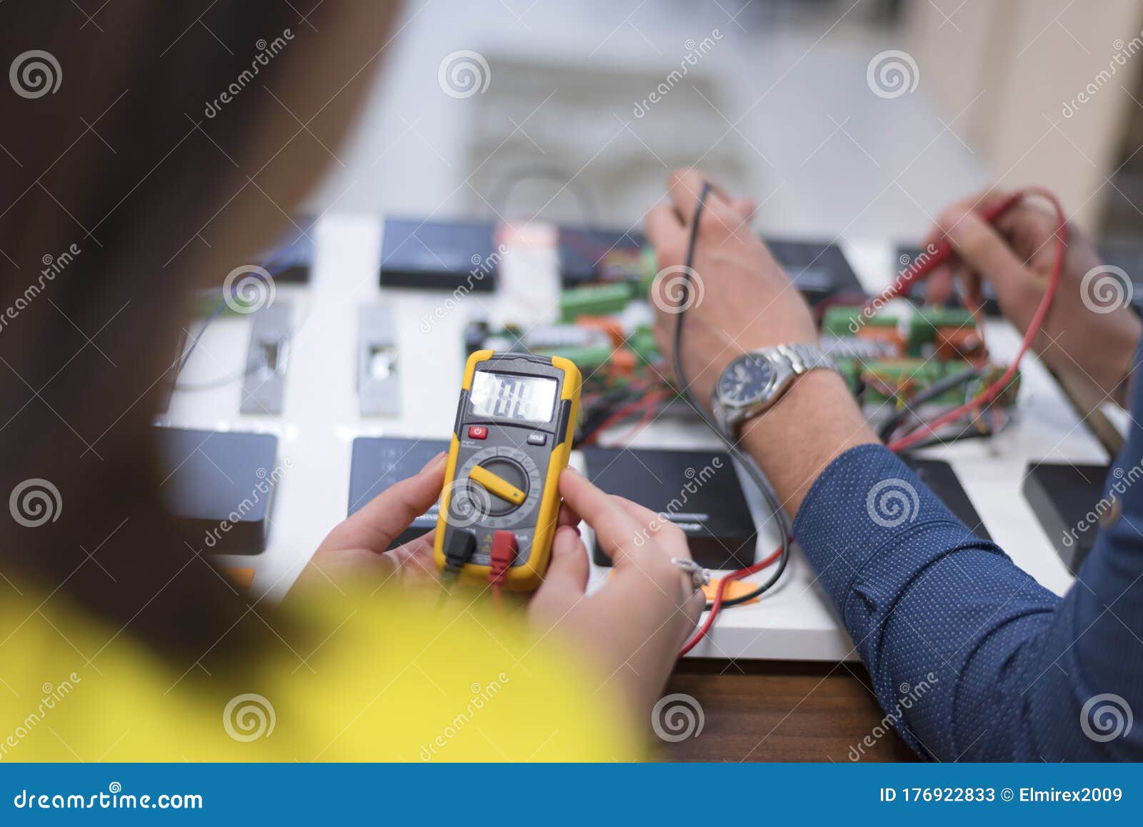 Two Young Handsome Engineers Working on Electronics Components.Tech ...