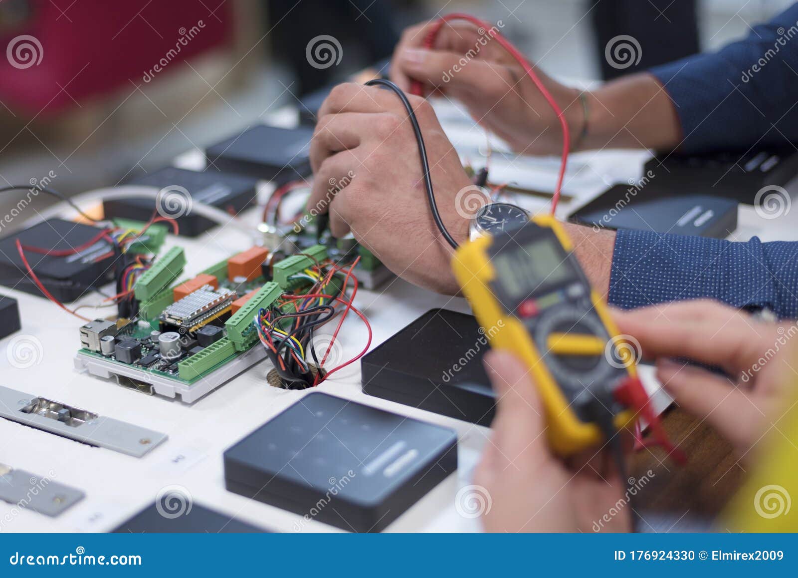 Two Young Handsome Engineers Working on Electronics Components.Tech ...
