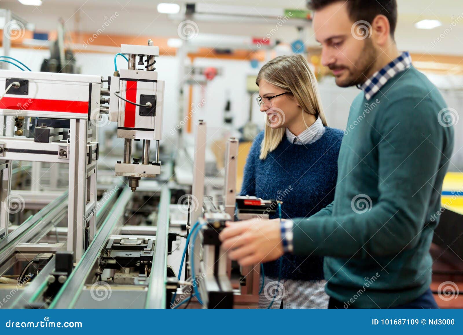 Two Young Handsome Engineers Working on Electronics Components Stock ...