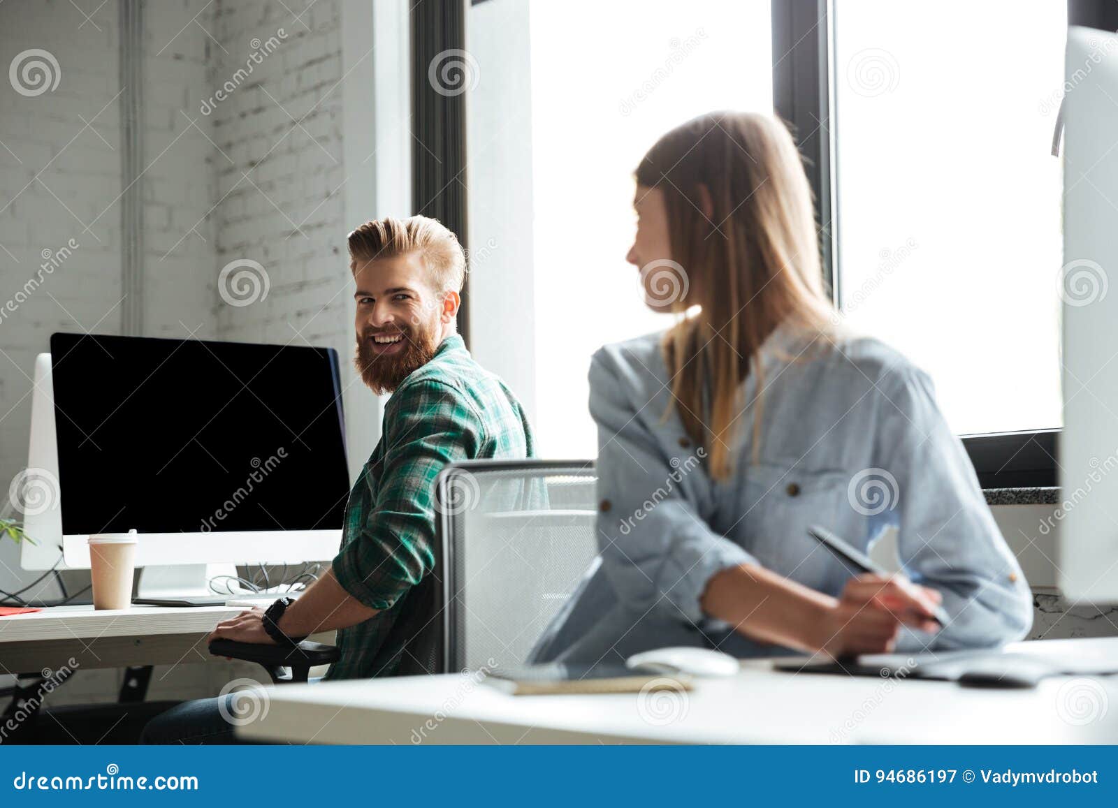Two Young Happy Colleagues Work in Office Stock Image - Image of ...